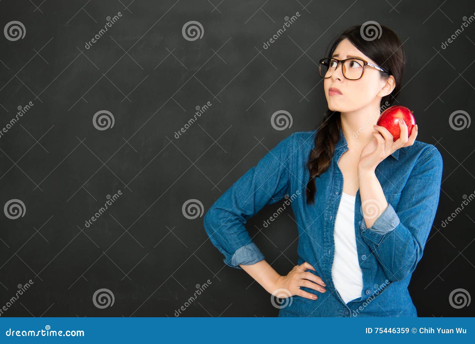 University Student Thinking Question in Front of Blackboard with Stock ...