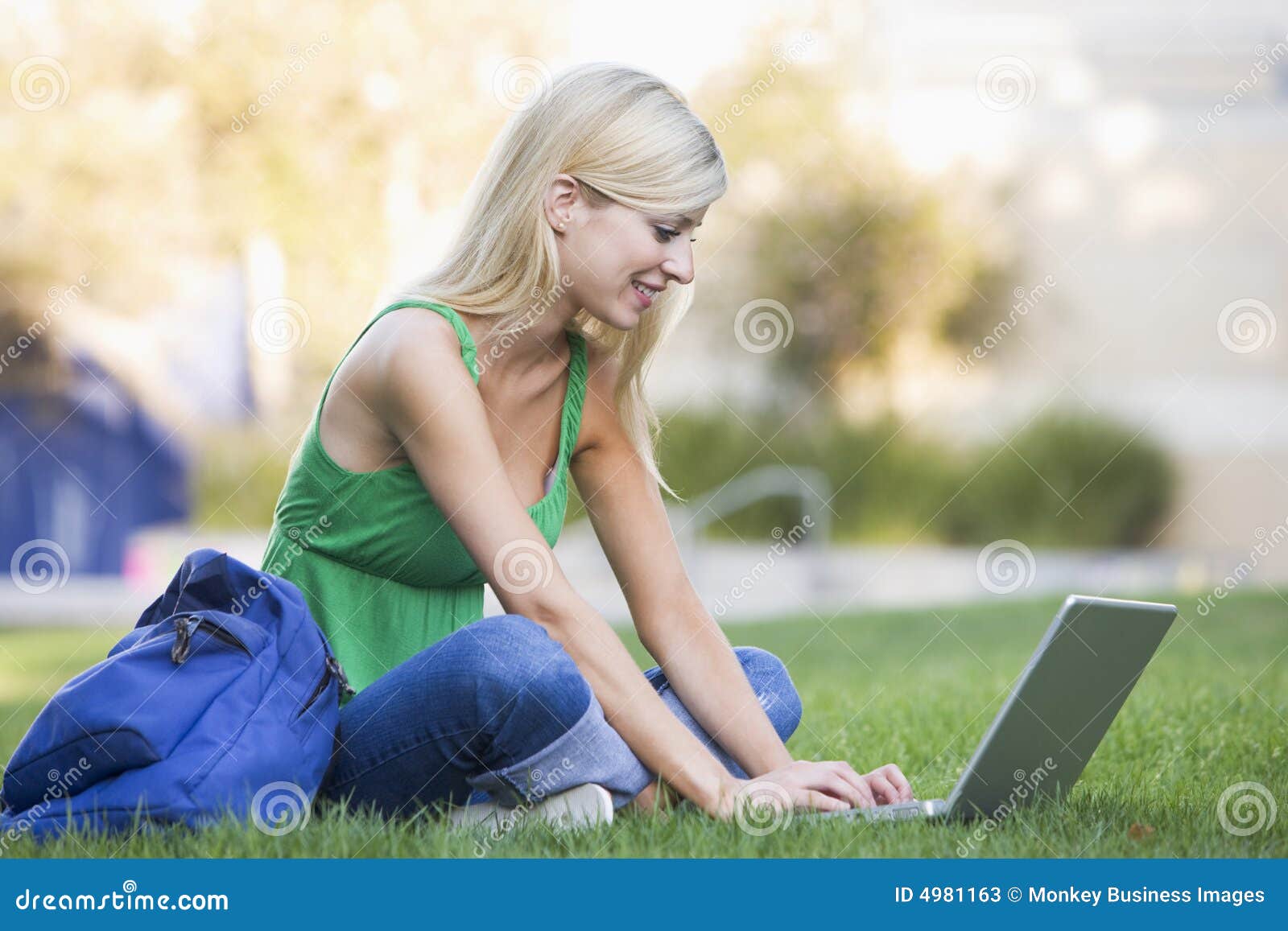 University Student Using Laptop Outside Stock Image - Image of ...