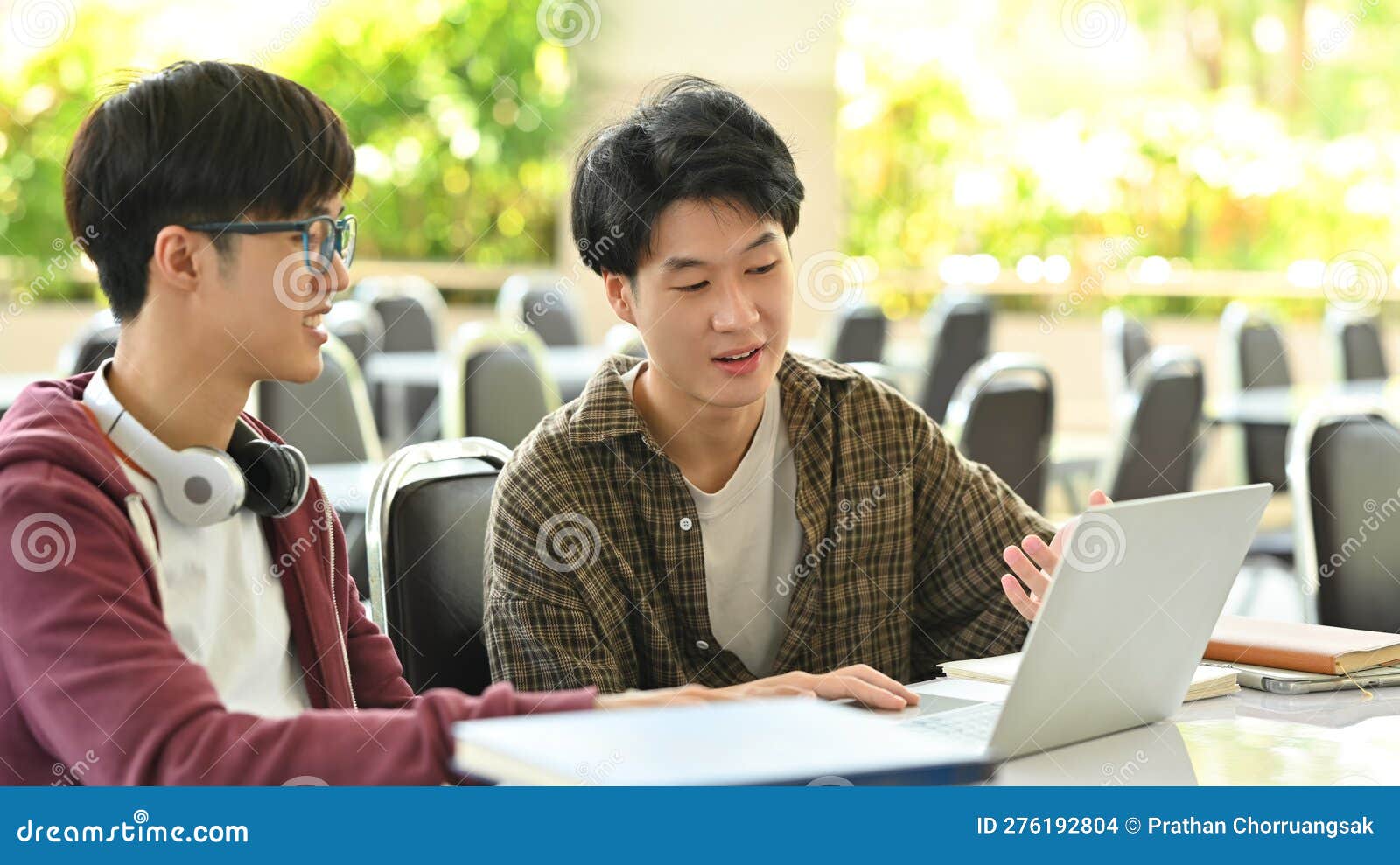 University Students Collaborating on a Project in Campus. Education ...