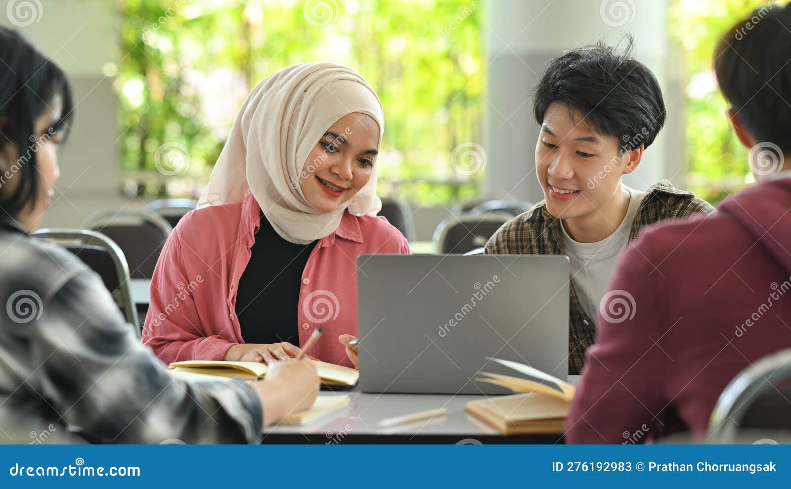 University Students Collaborating on a Project in Campus. Education ...