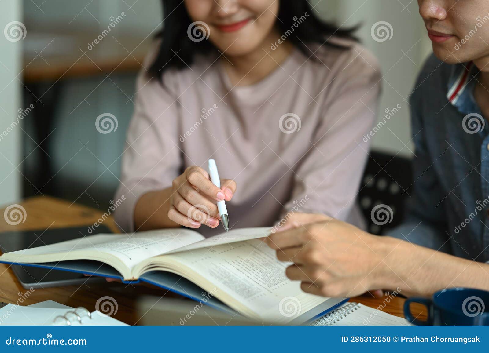 University Students Collaborating on a Project in Campus. Education ...