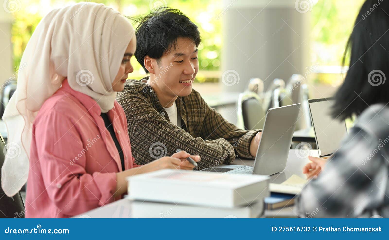 University Students Collaborating on a Project in Campus. Education ...