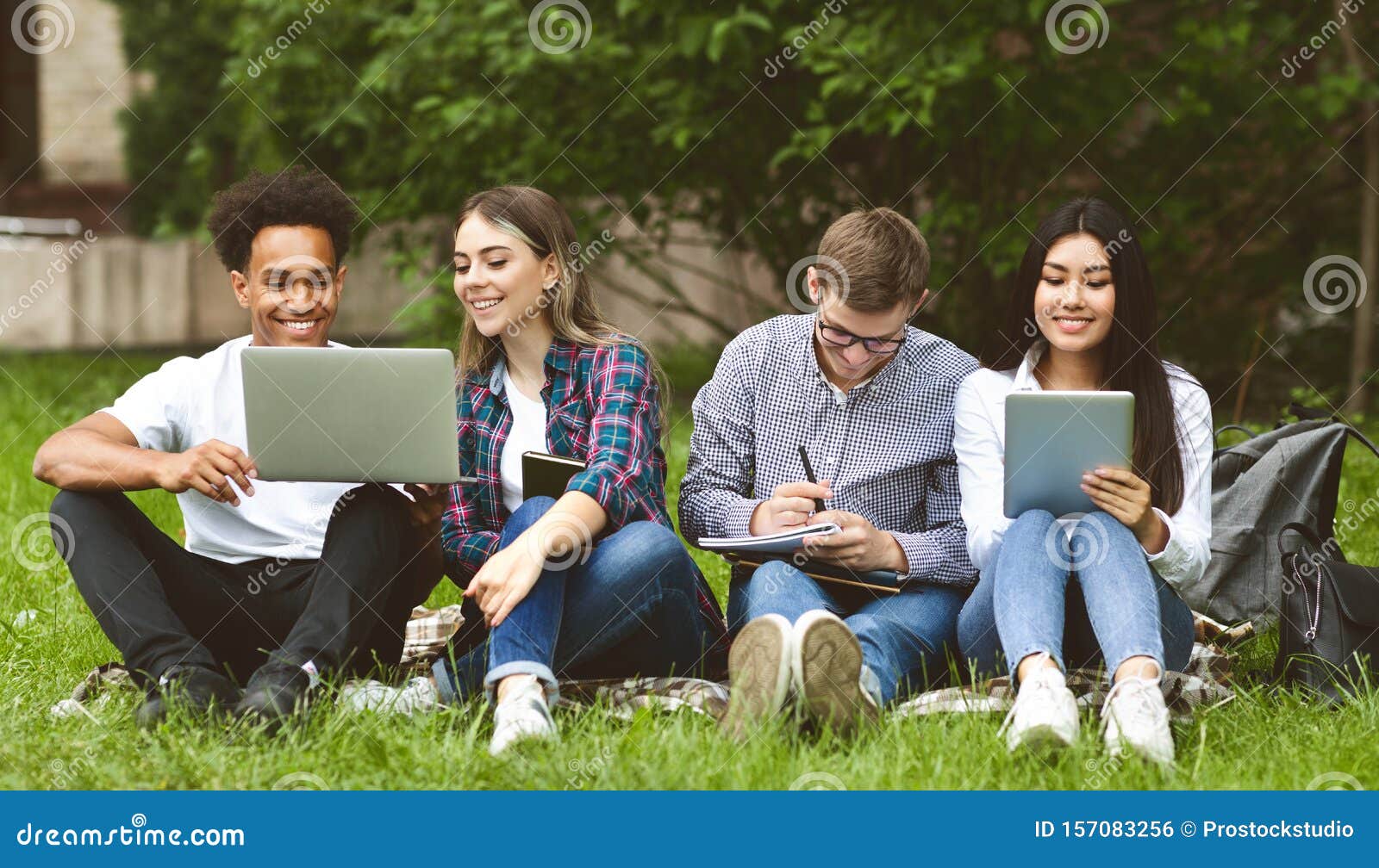 University Students with Devices Preparing for Classes Stock Photo ...