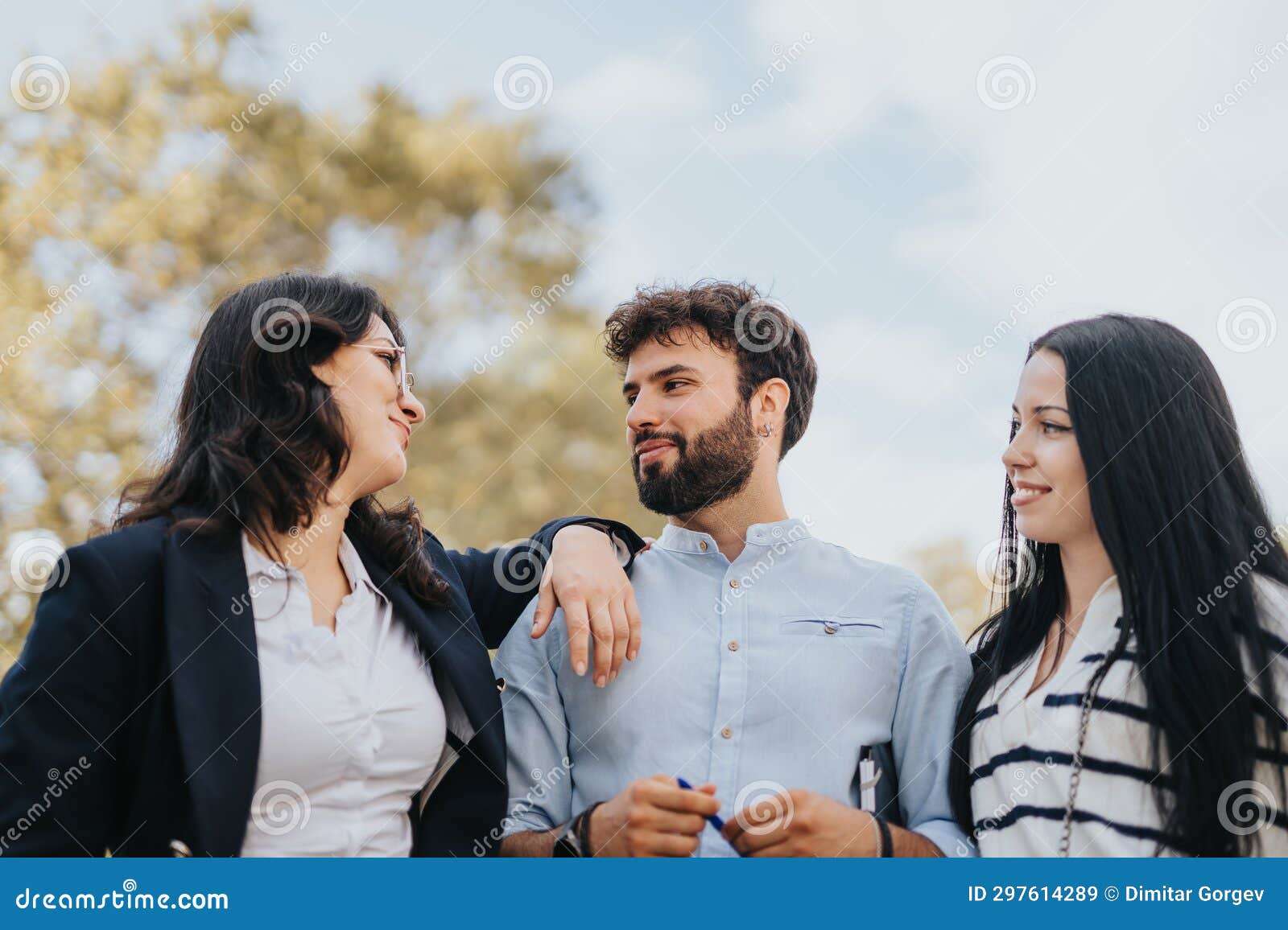 University Students Discussing Subject Topics and Helping Each Other ...