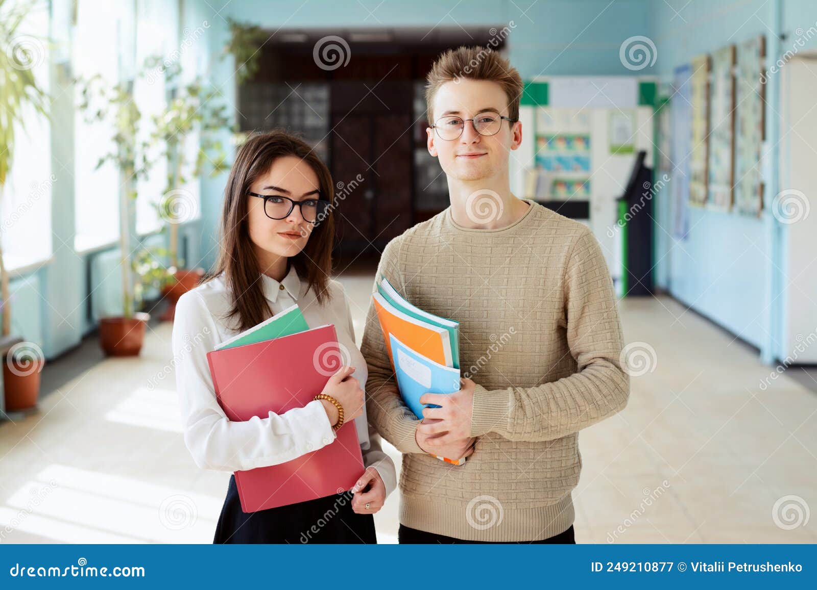 University Students are Eager To Study, Looking To the Camera Stock ...
