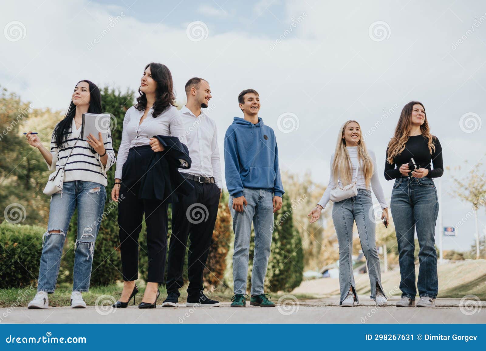 University Students Happily Study Together Outdoors, Discussing Subject ...