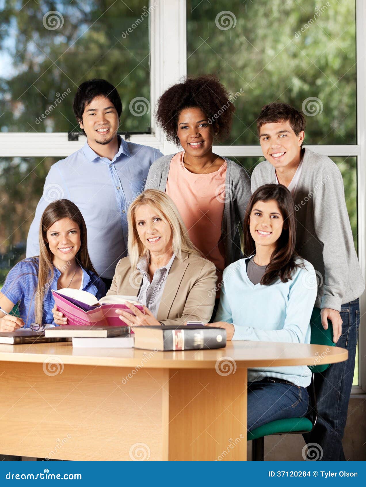 University Students and Professor with Books in Stock Photo - Image of ...