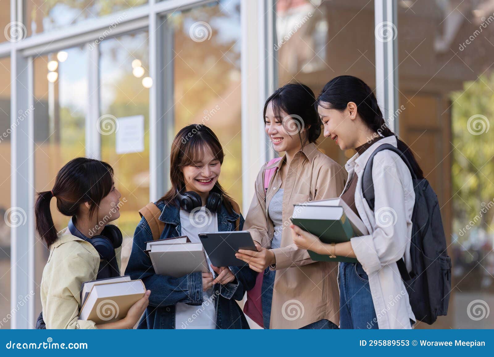 University Students Reading Books and Tutoring Special Class while ...