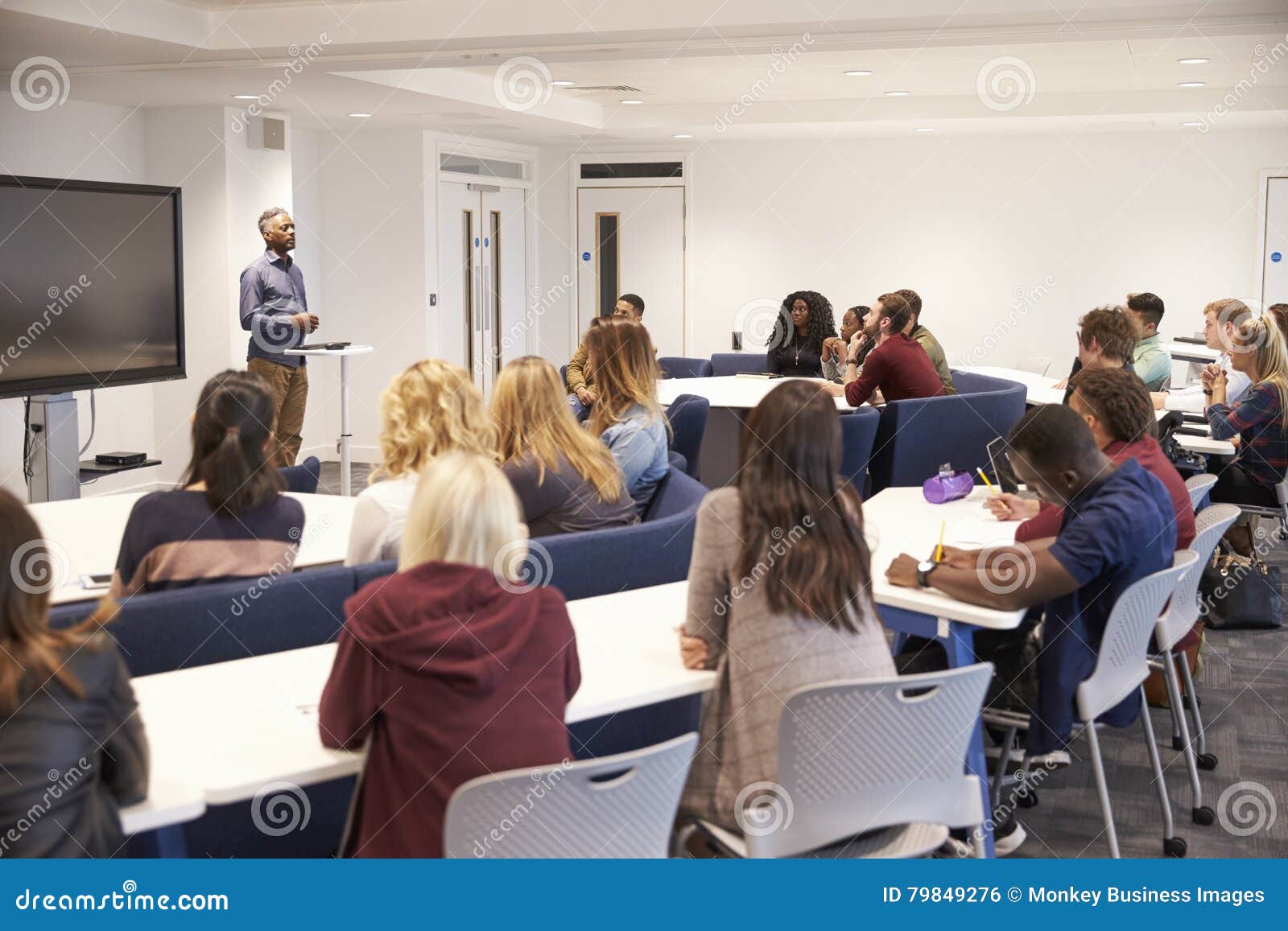 University Students Study in a Classroom with Male Lecturer Stock Photo ...