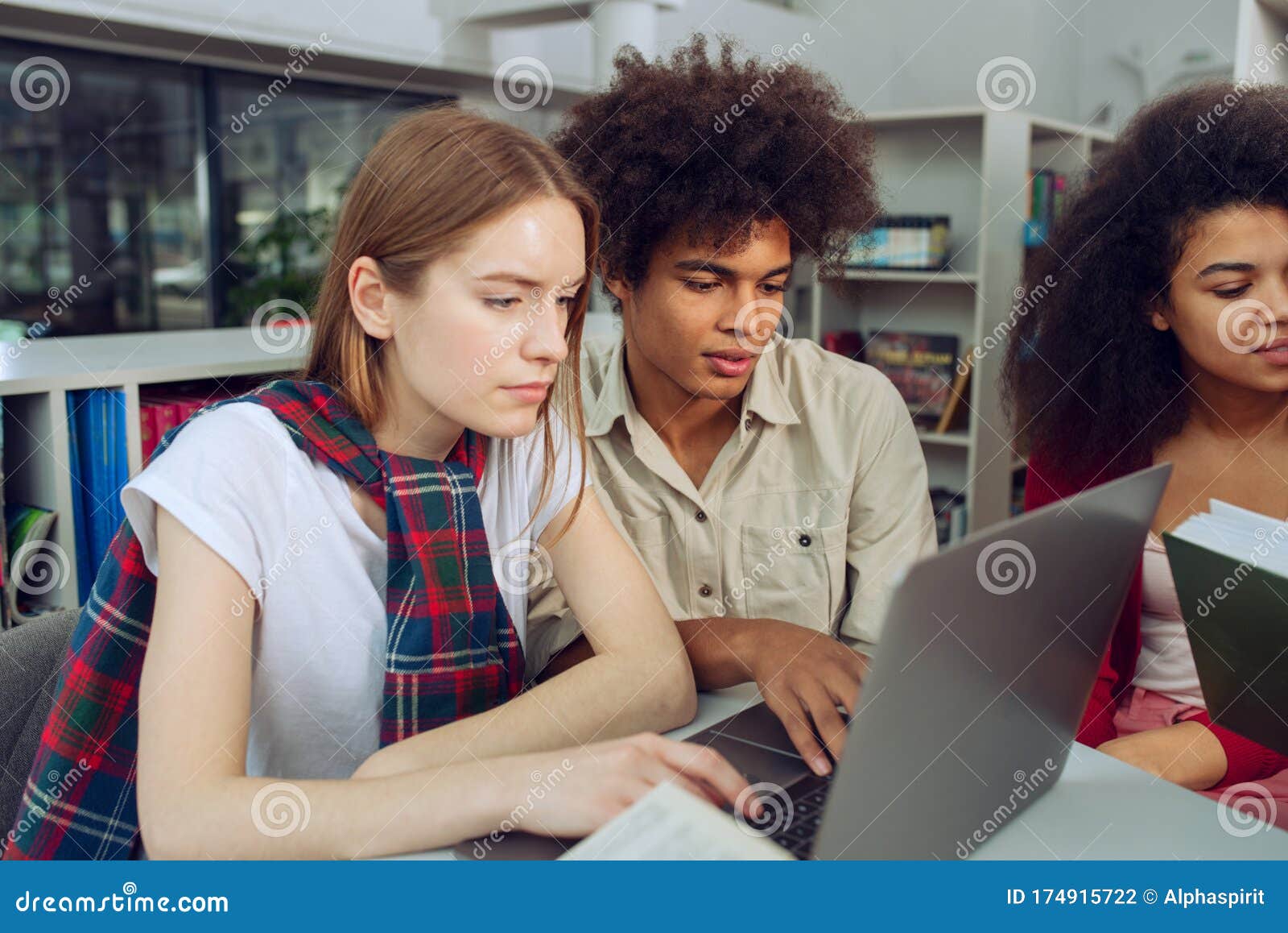 University Students are Studying in a Library Together. Concept of ...