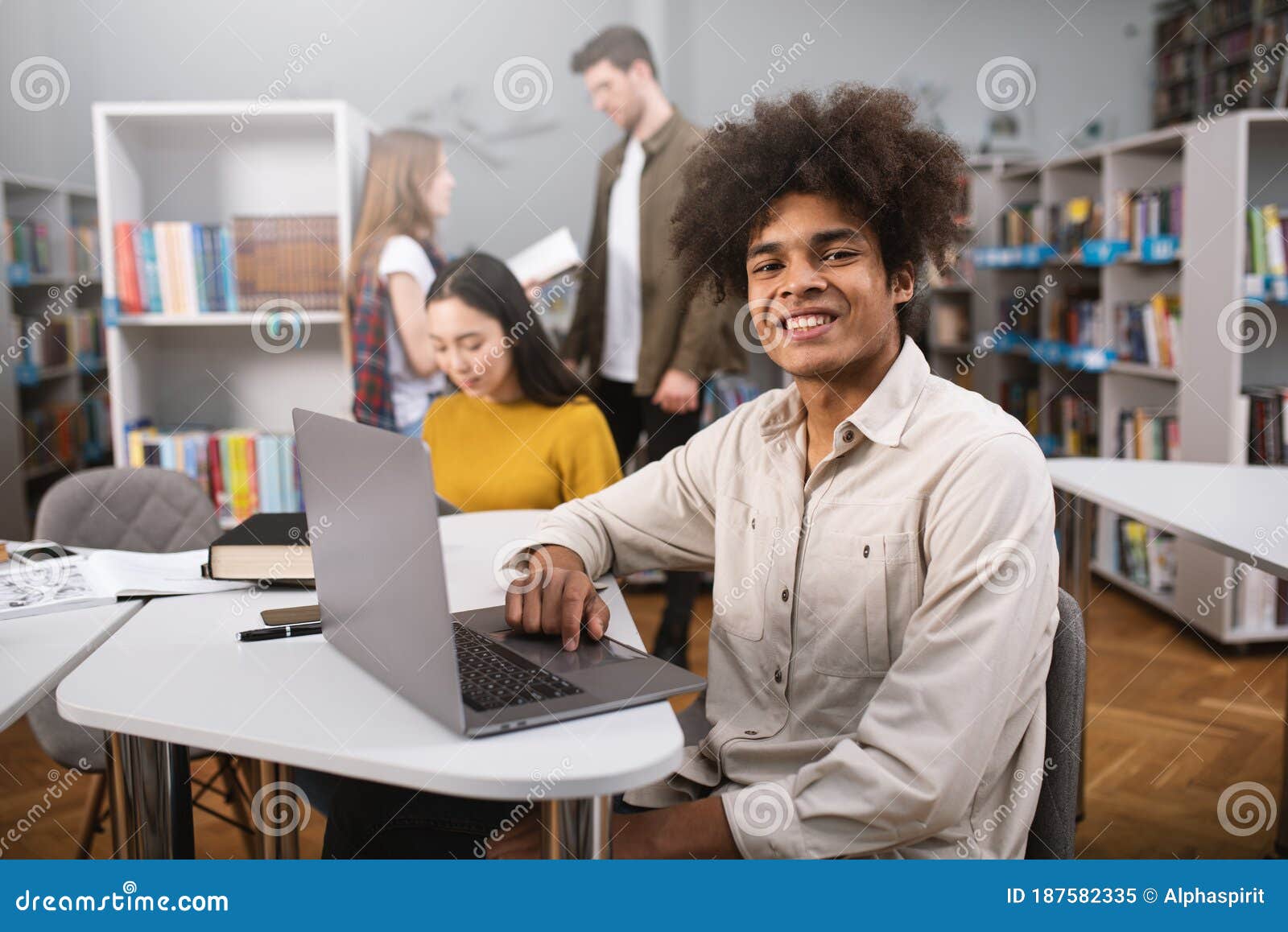 University Students are Studying in a Library Together. Concept of ...