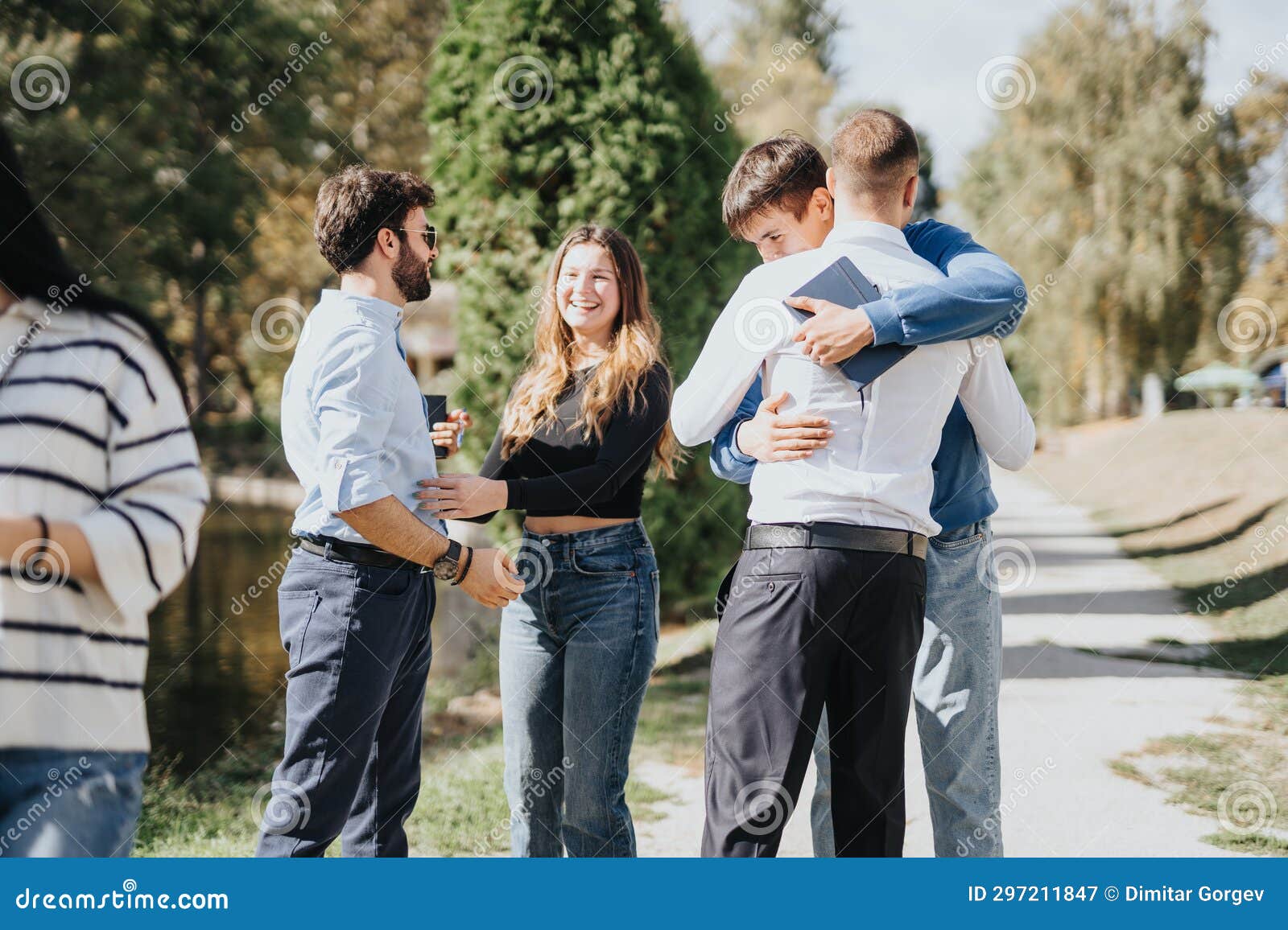 University Students Studying Outdoors, Discussing Subject Topics ...