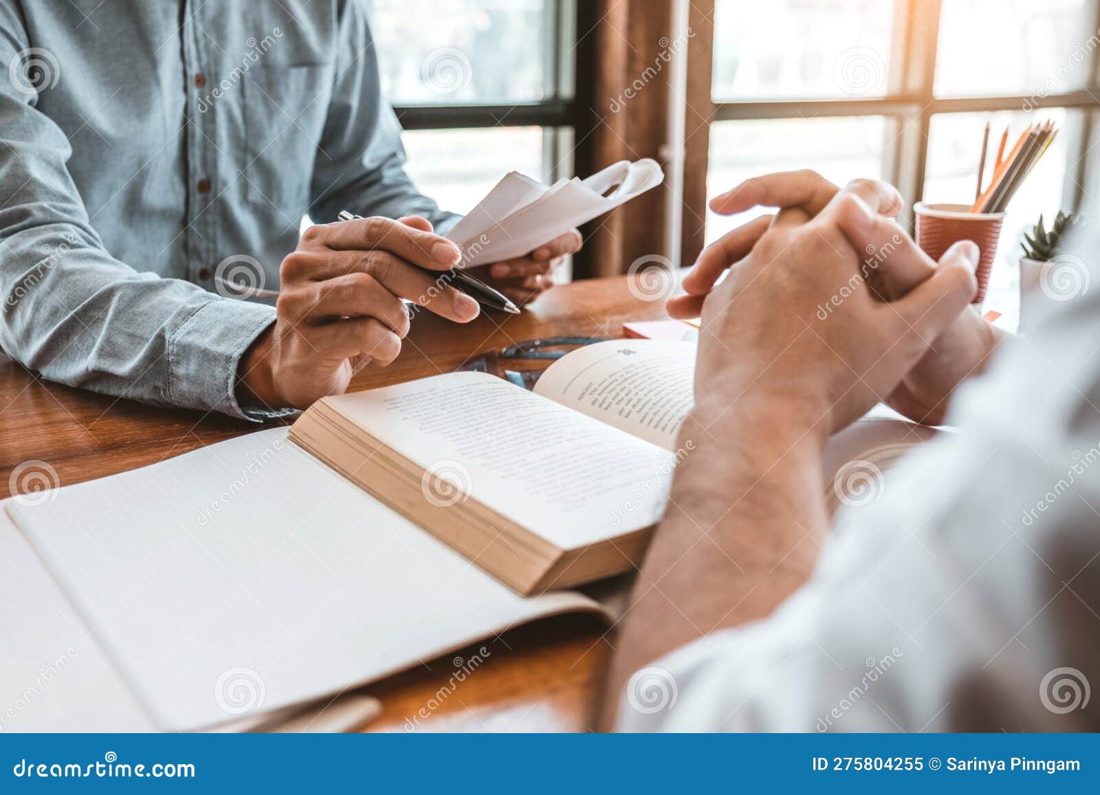 University Students Studying and Reading Together in Library Research ...
