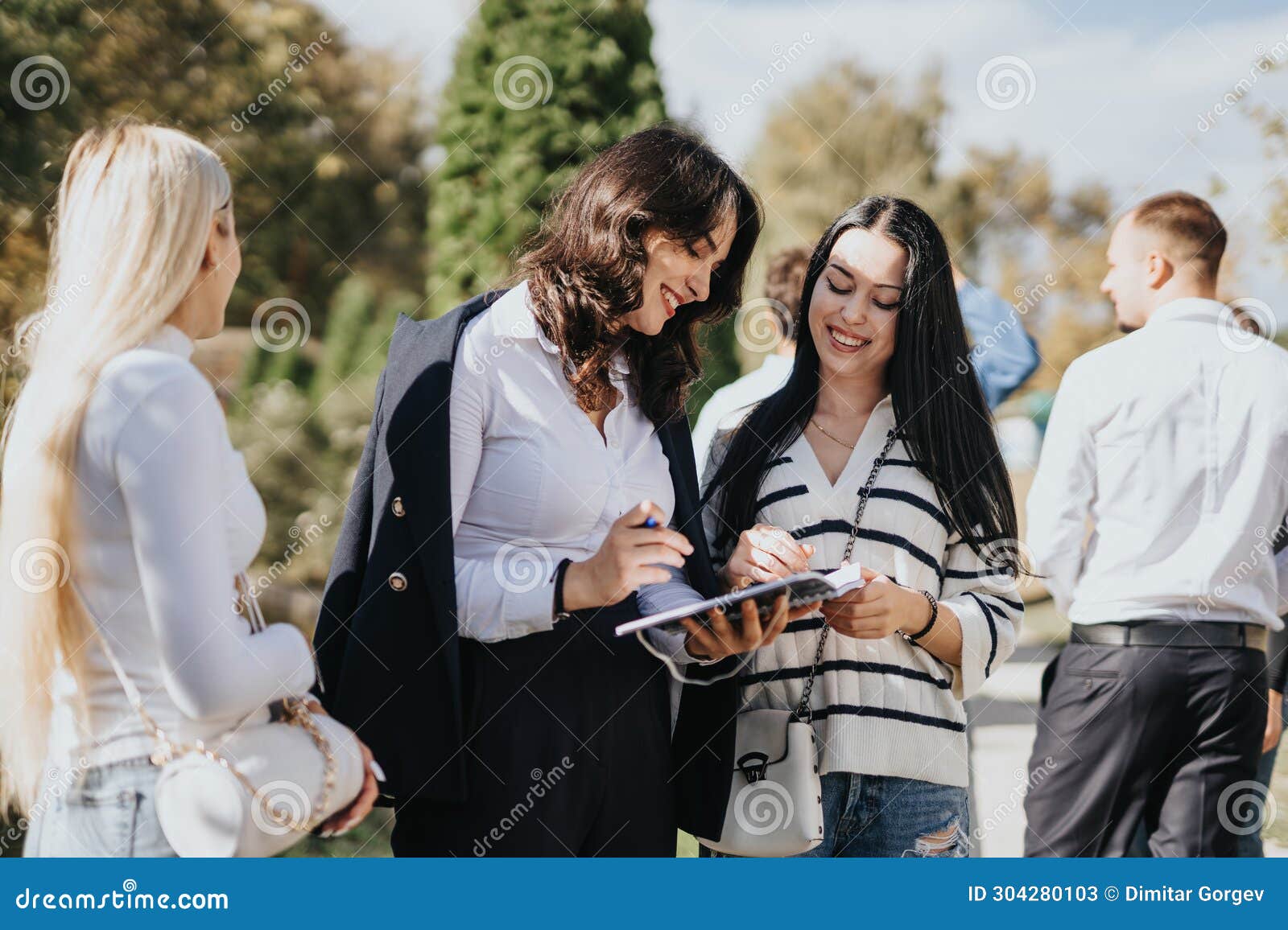 University Students Studying Together, Discussing Subjects, Exchanging ...