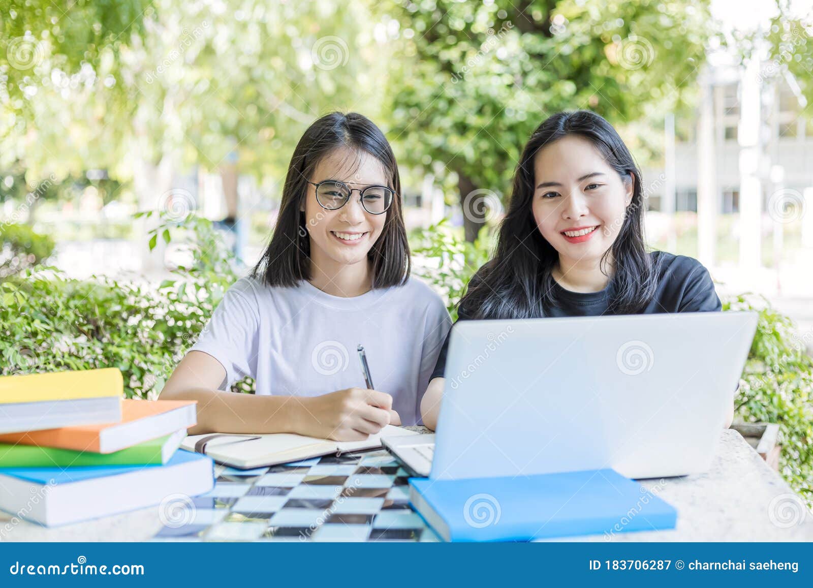University Students Use Laptop for Reading and Learning Concept Stock ...