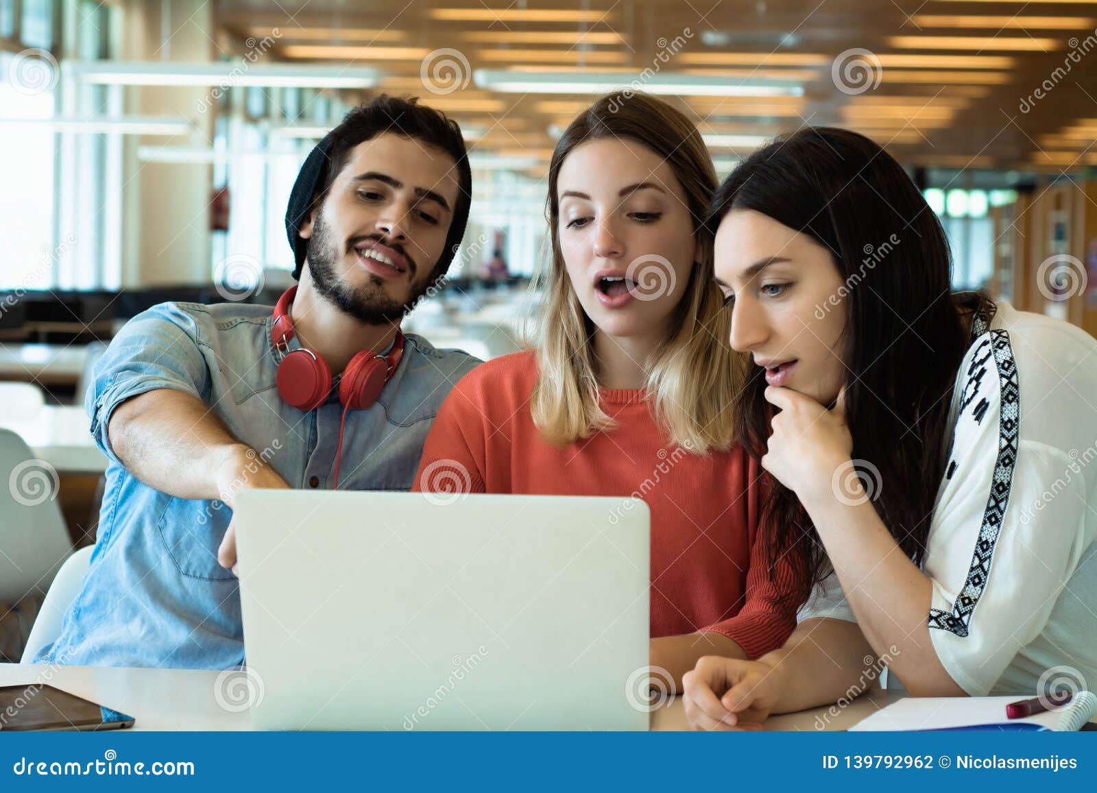 University Students Using Laptop in University Library Stock Photo ...