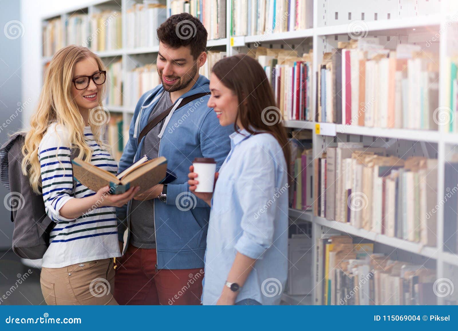 Students Working in the Library at Campus Stock Photo - Image of ...