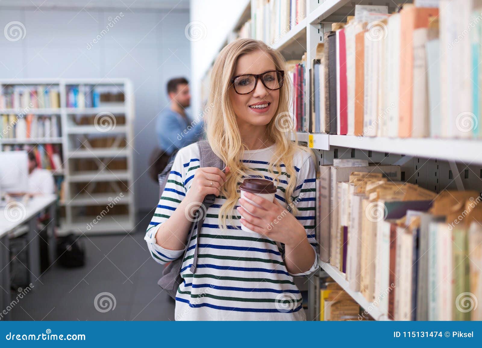 Students Working in the Library at Campus Stock Photo - Image of laptop ...
