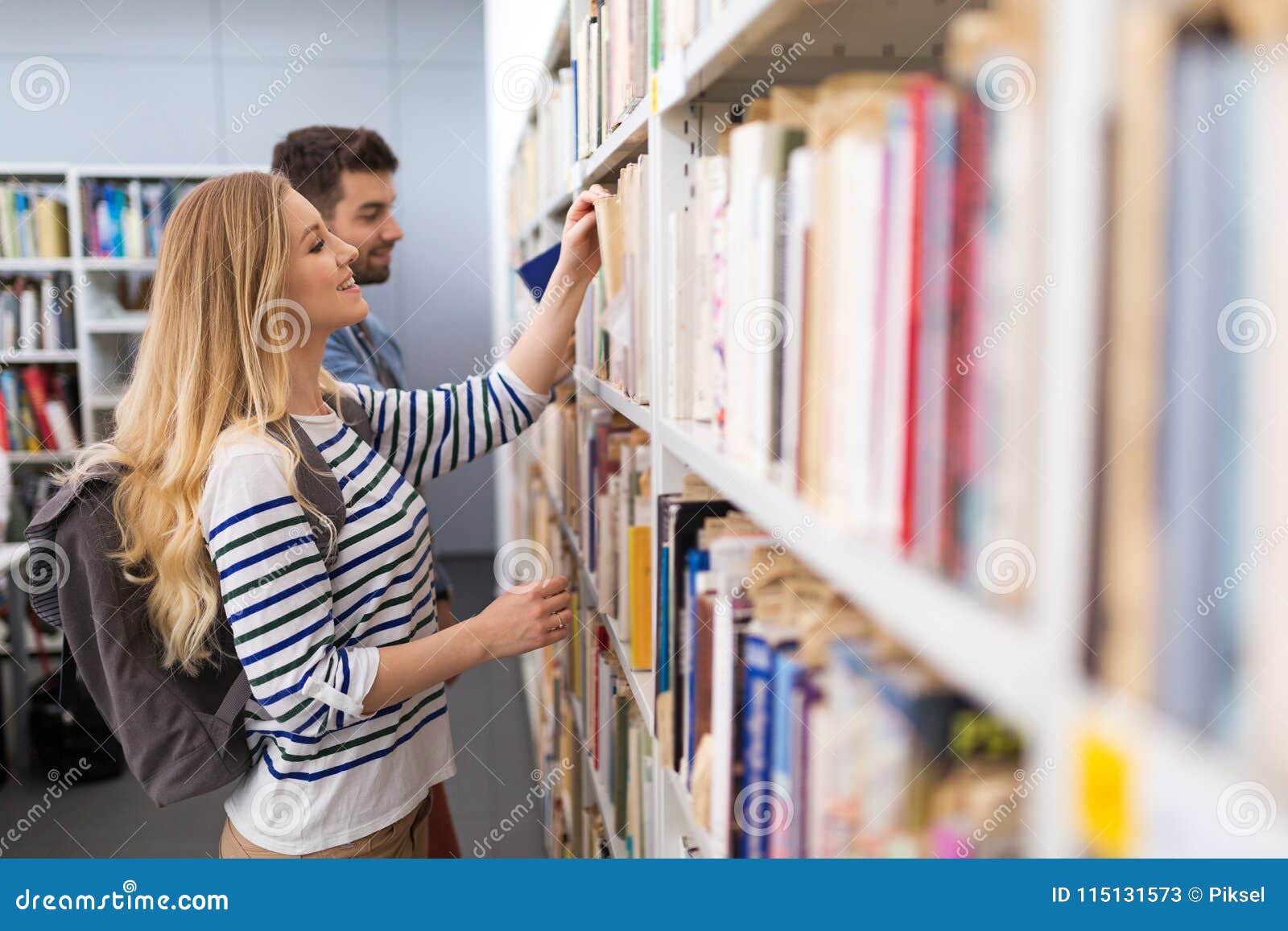 Students Working in the Library at Campus Stock Image - Image of laptop ...