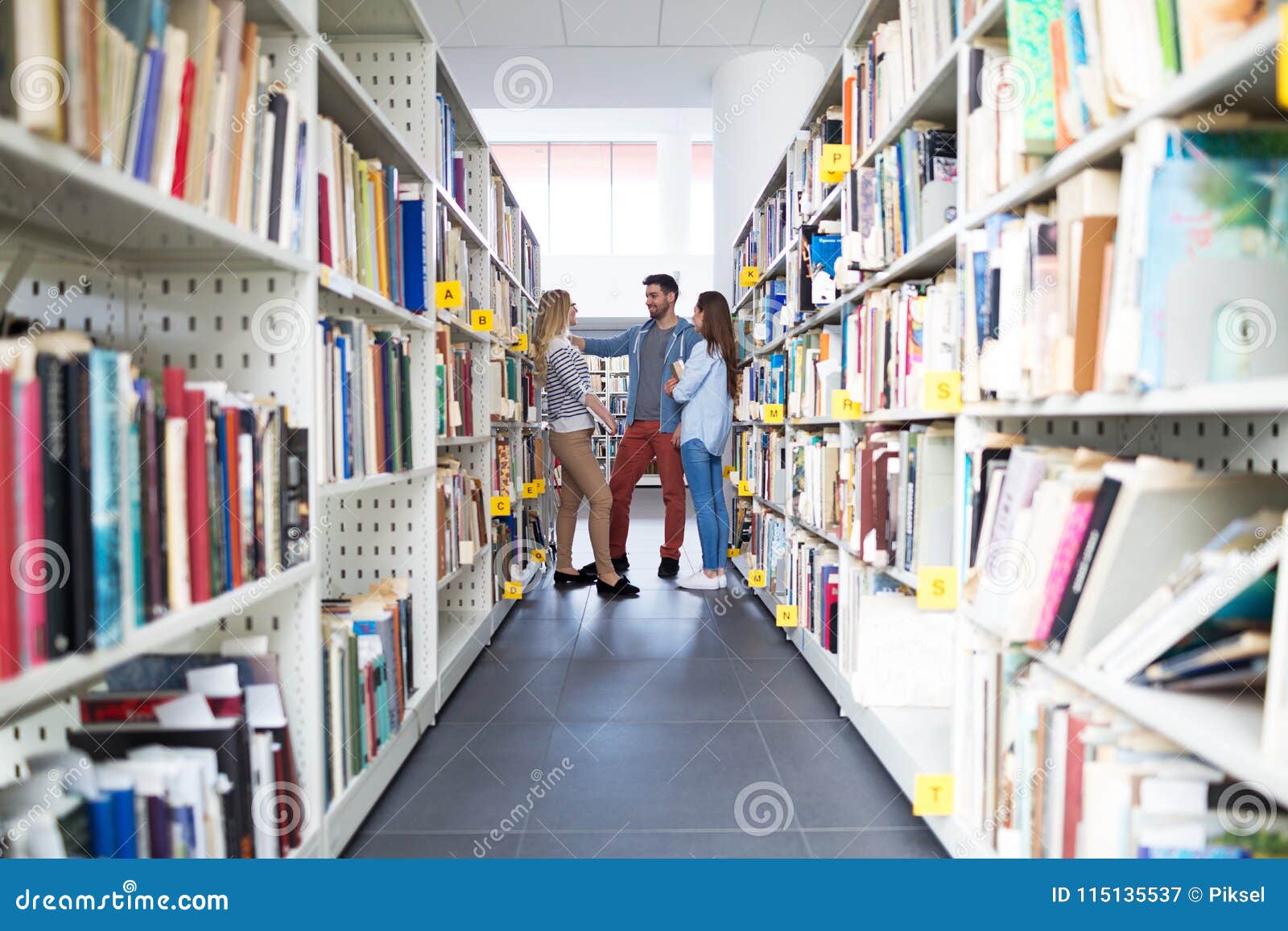 Students Working in the Library at Campus Stock Image - Image of ...