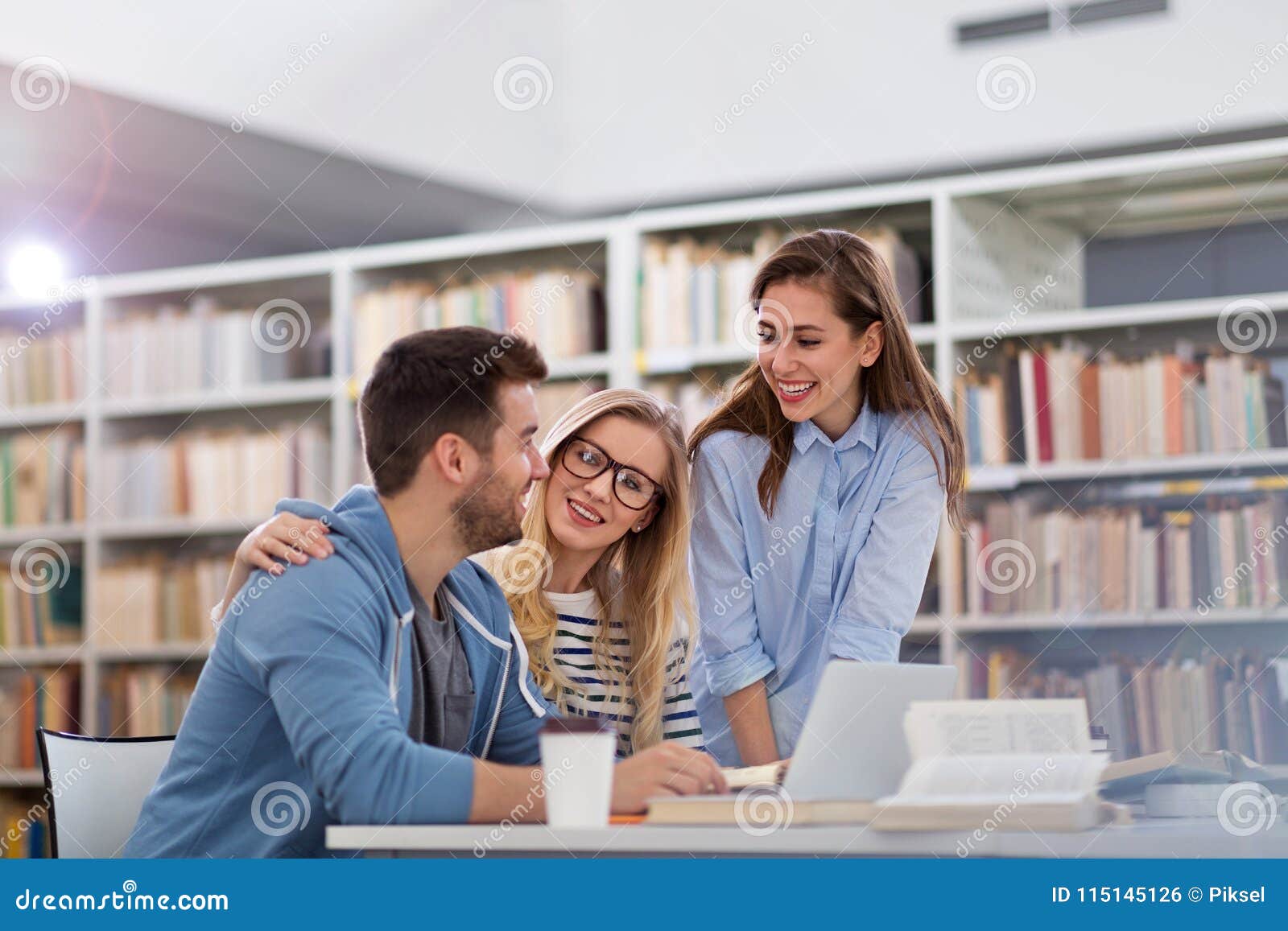 Students Working in the Library at Campus Stock Photo - Image of ...