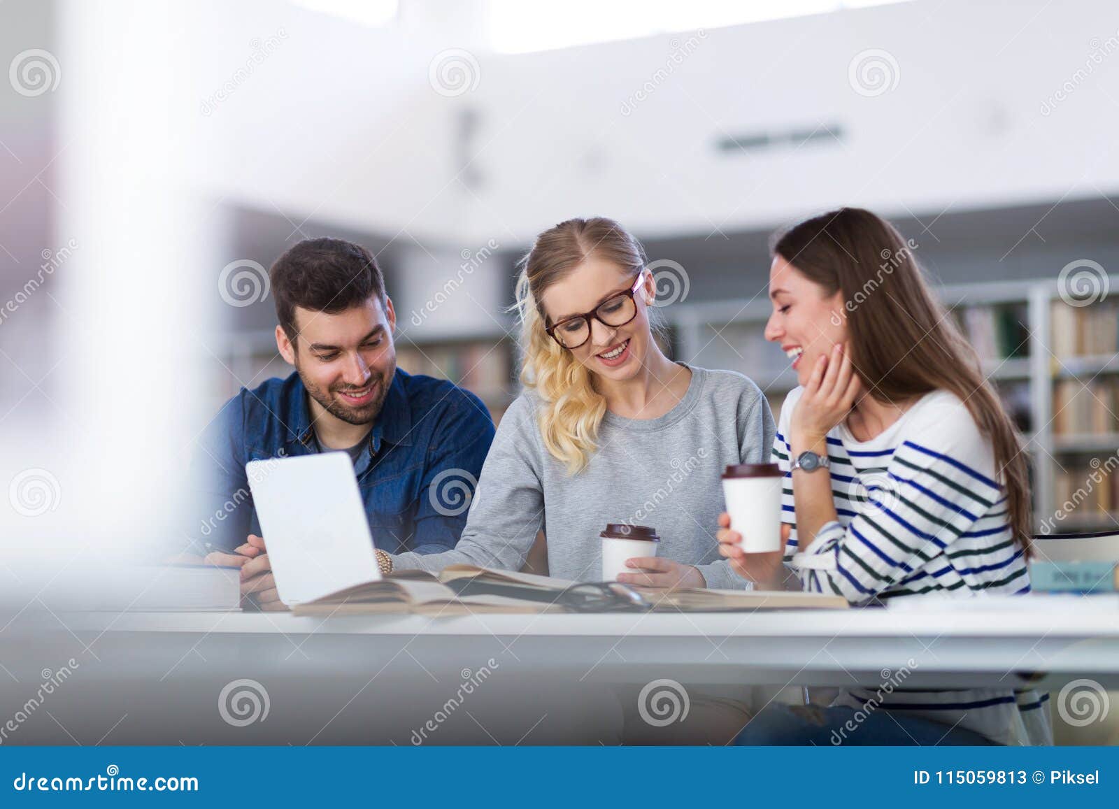 Students Working In The Library At Campus Royalty-Free Stock Photo ...