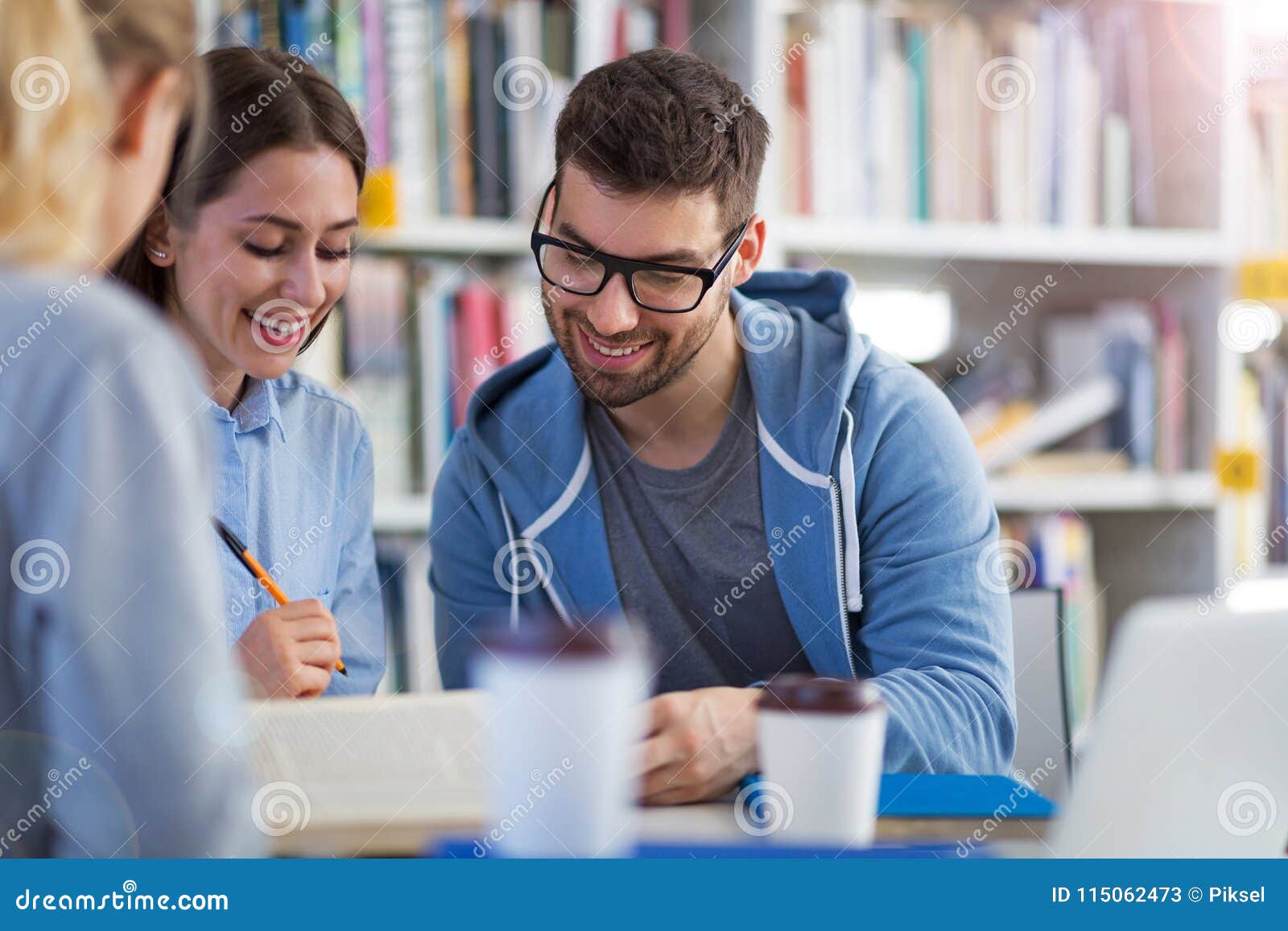 Students Working in the Library at Campus Stock Image - Image of ...