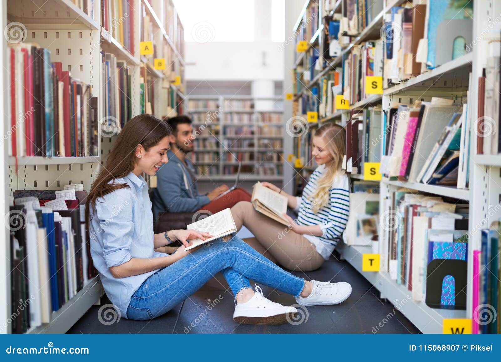 Students Working in the Library at Campus Stock Image - Image of people ...