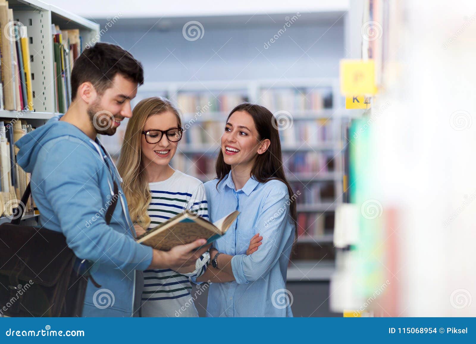 Students Working in the Library at Campus Stock Photo - Image of ...