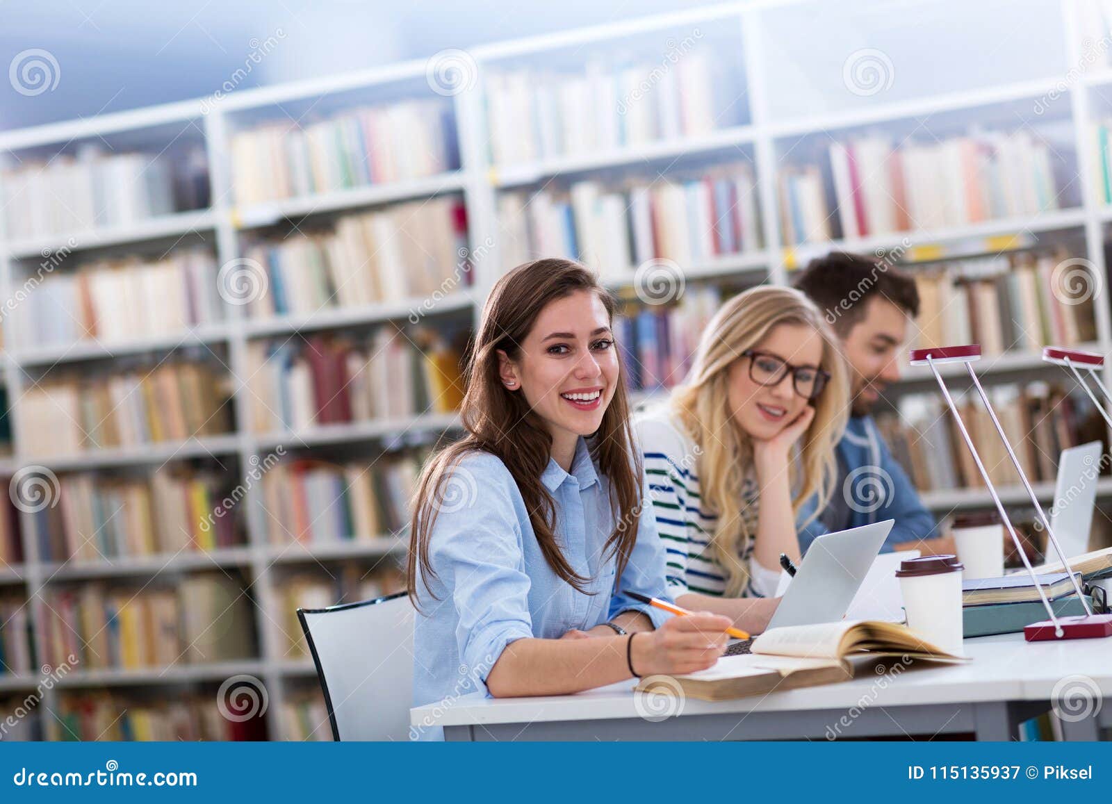 Students Working in the Library at Campus Stock Image - Image of ...