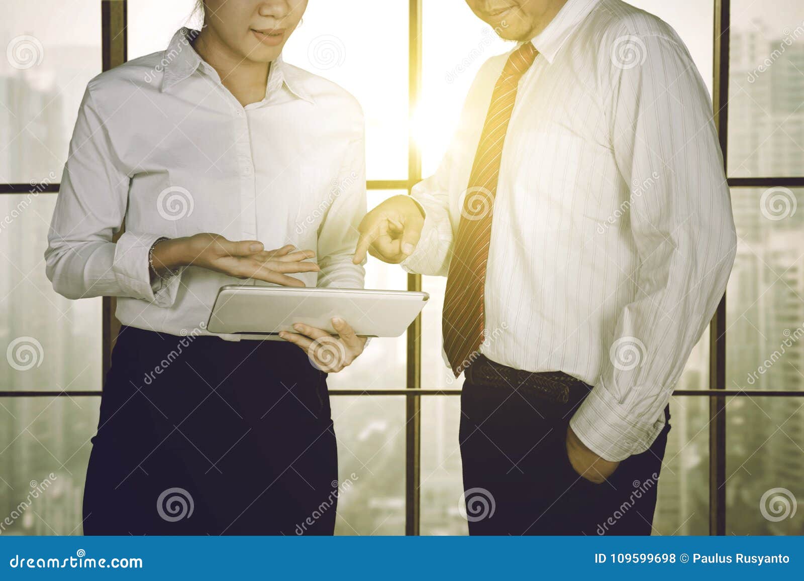 Unknown Business People with Tablet Near the Window Stock Photo - Image ...