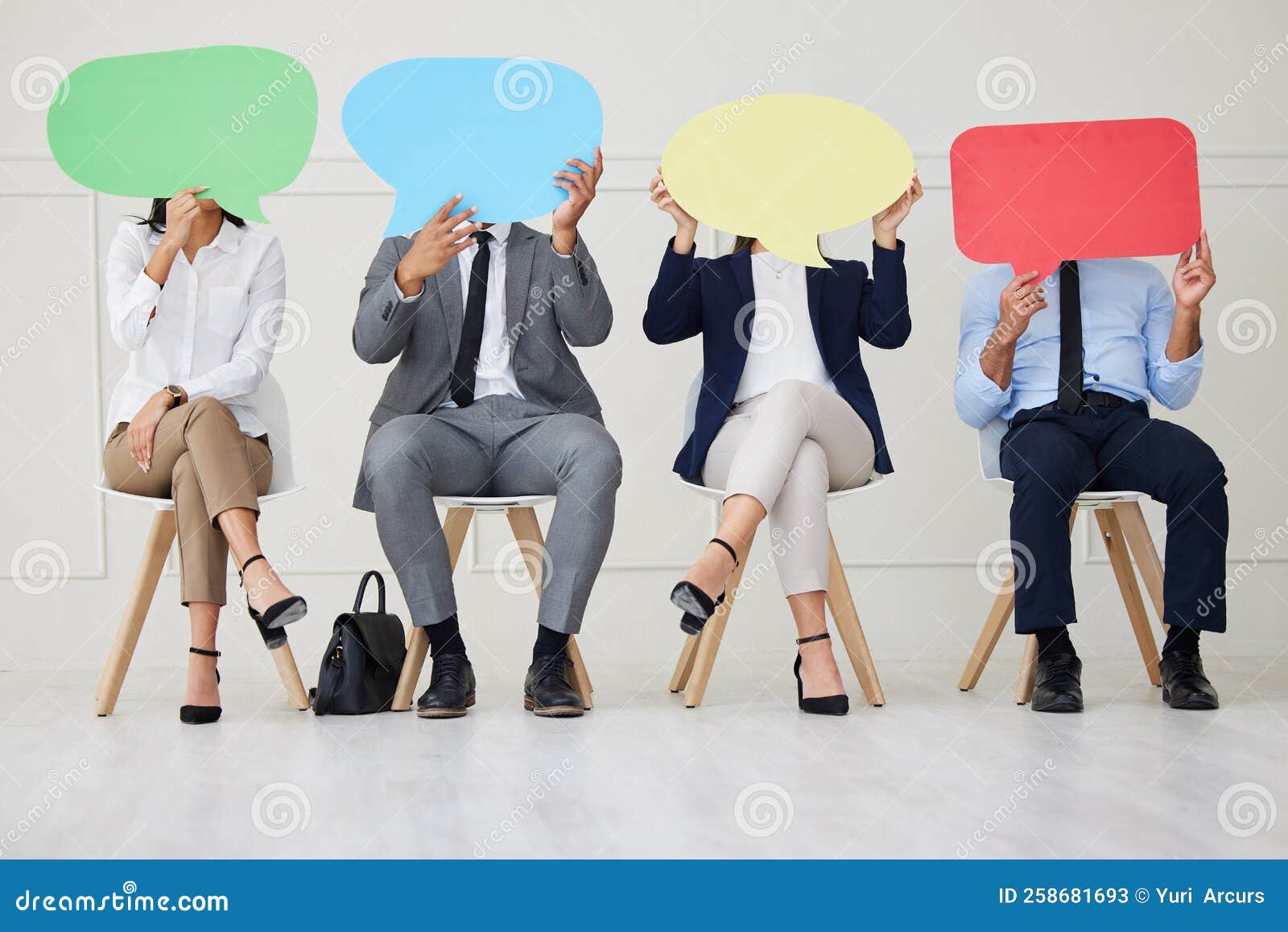 Unknown Group of Diverse Businesspeople Holding Speech Bubble while ...