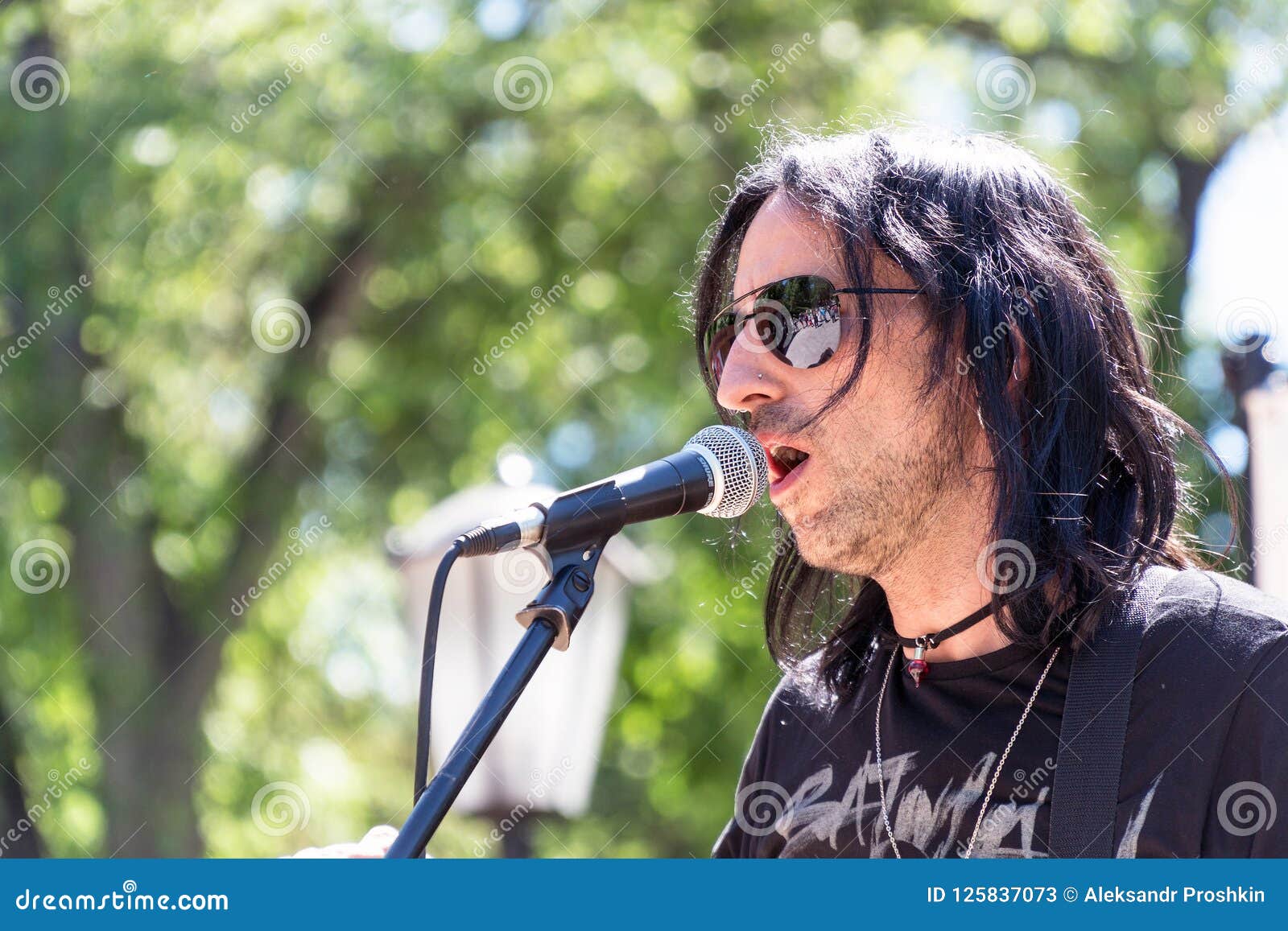 Unknown Singer Sings into the Microphone in the Park Editorial Stock ...