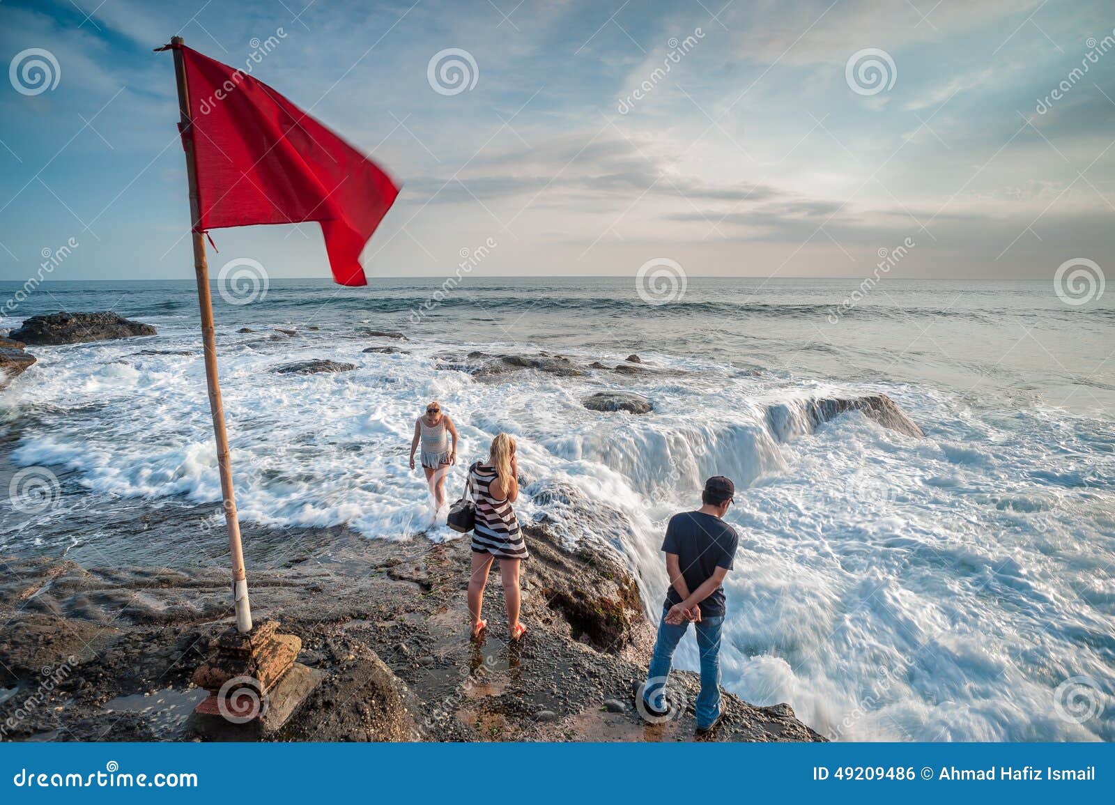 Unknown Tourists Standing on Crashing Waves Editorial Photo - Image of ...