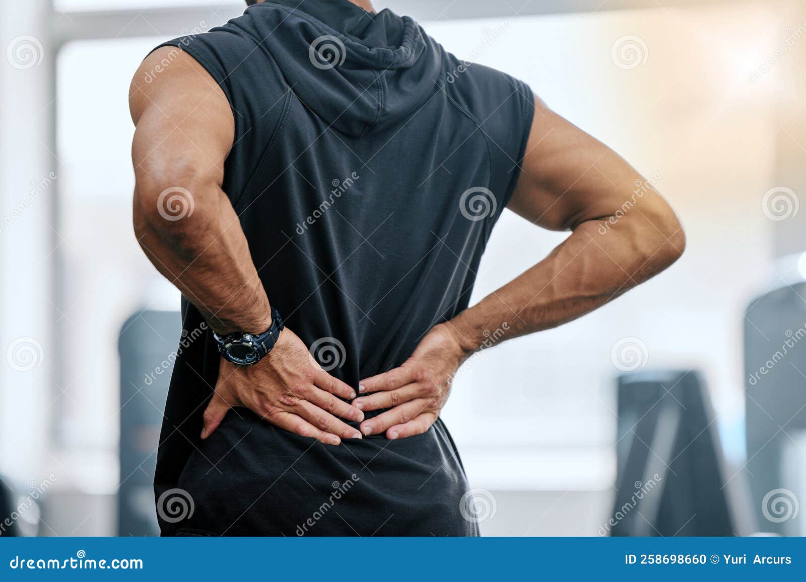 Unknown Trainer Alone in Gym and Suffering from Back Injury. Coach ...