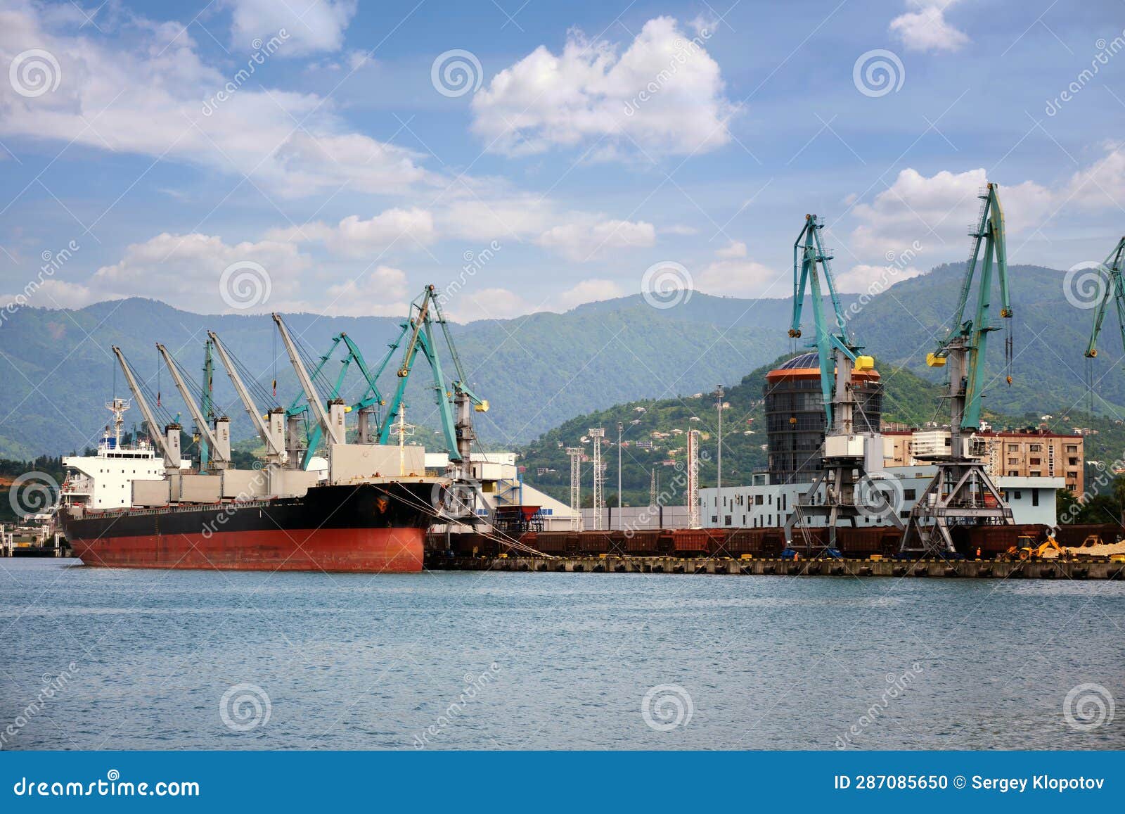 Unloading a Batch of Grain from a Large Dry Cargo Ship in the Seaport ...