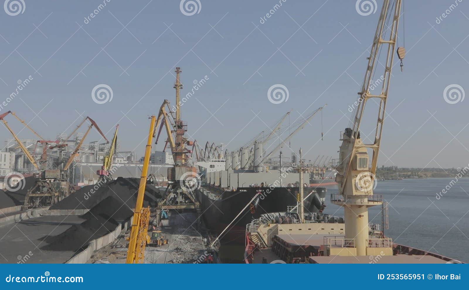 Unloading Coal from the Ship Cranes. the Ship is Unloaded by Cranes in ...