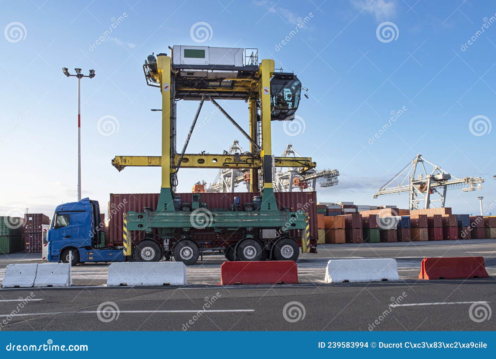 Unloading of Containers on a Quay Stock Photo - Image of cargo, port ...