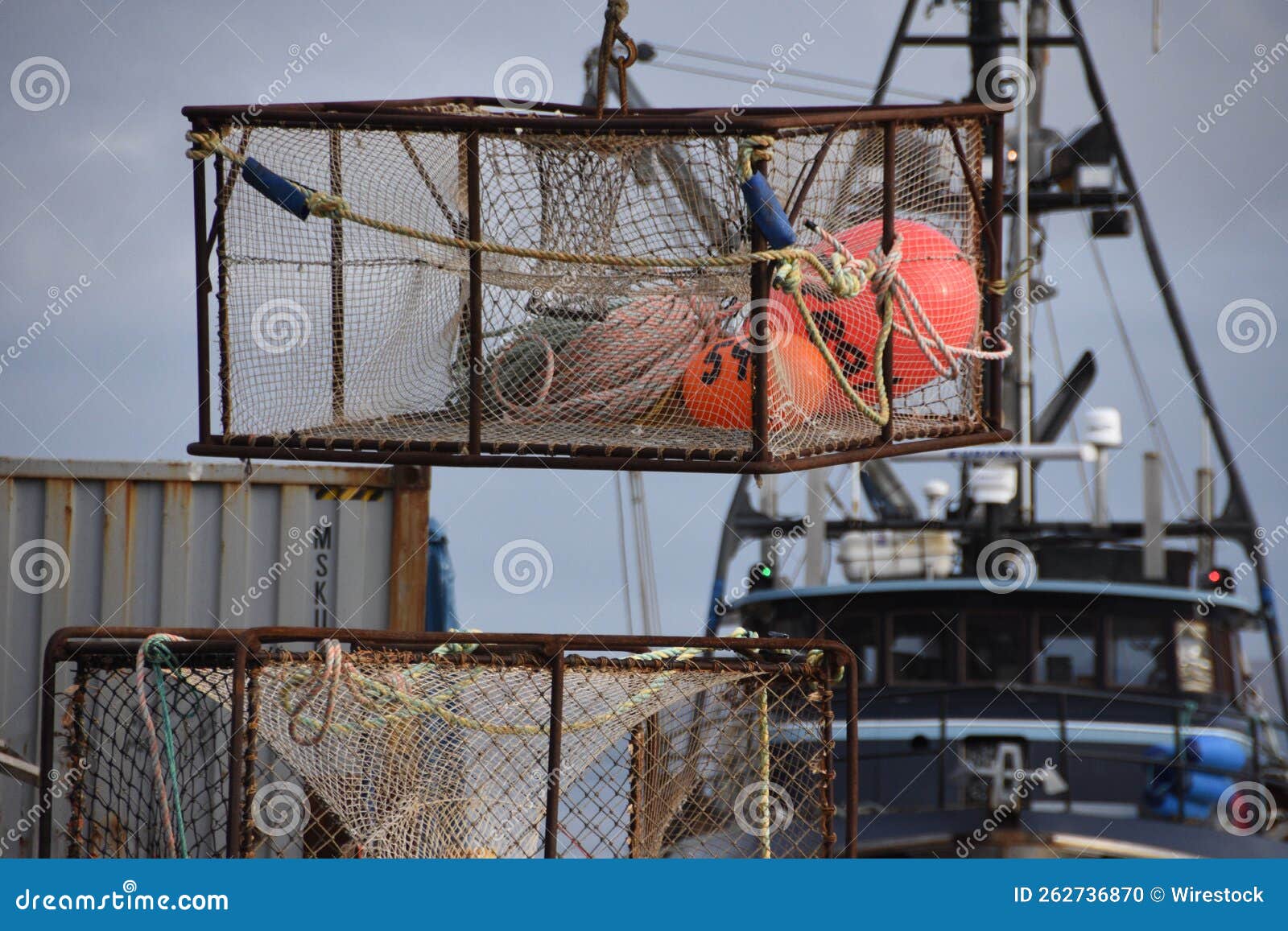 Unloading of a Metal Crab Cage on a Ship Dock Editorial Image - Image ...
