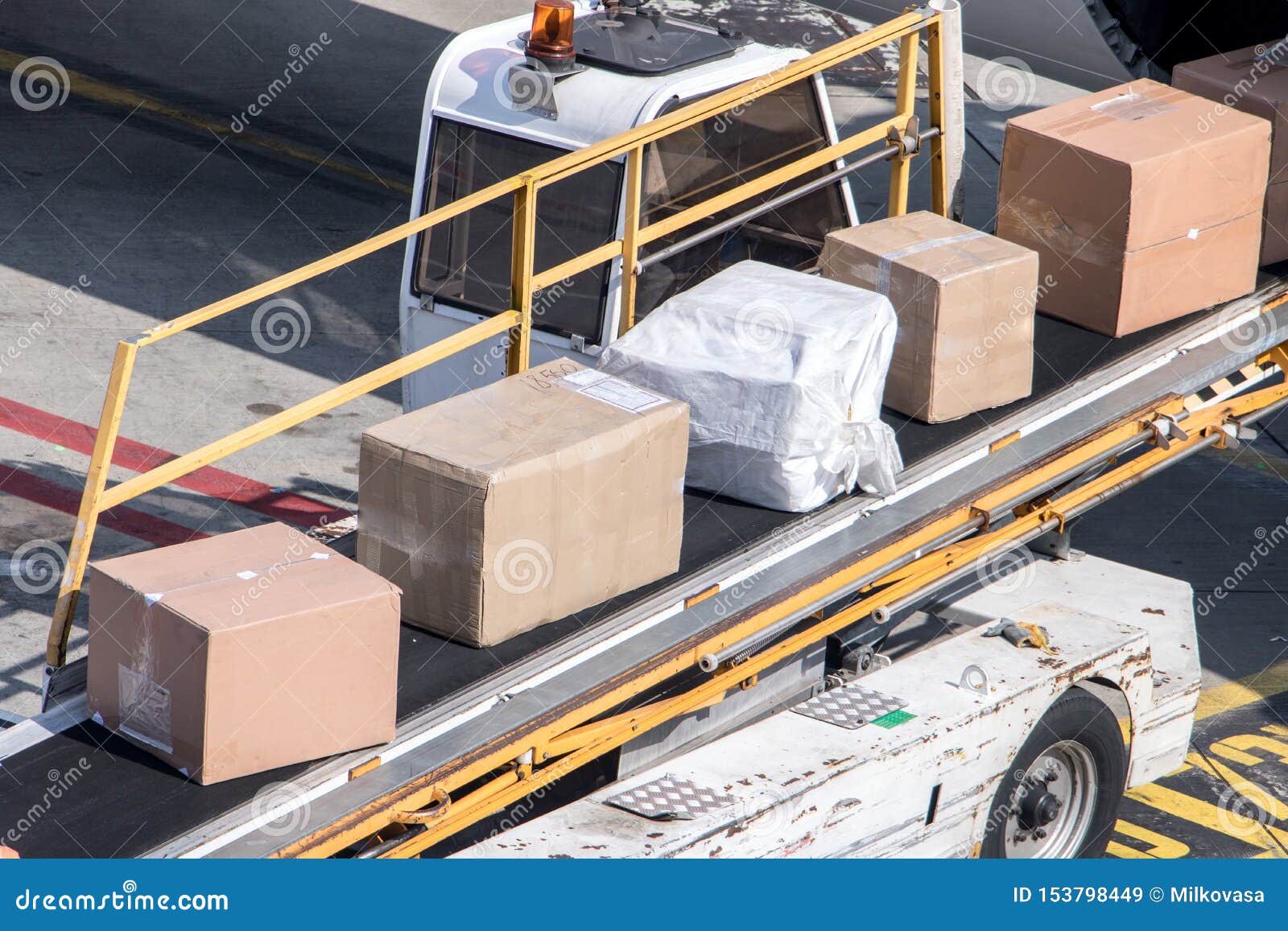 Unloading the Packet from the Fuselage of Aircraft. Stock Image - Image ...