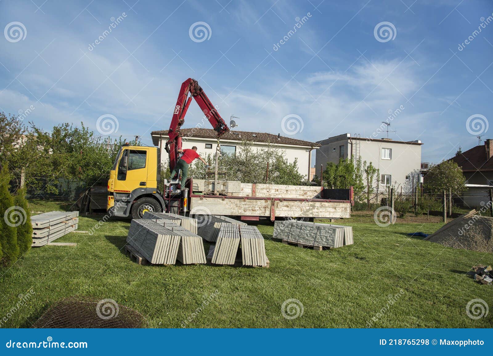 Unloading Pallet from the Truck with a Crane Stock Photo - Image of ...