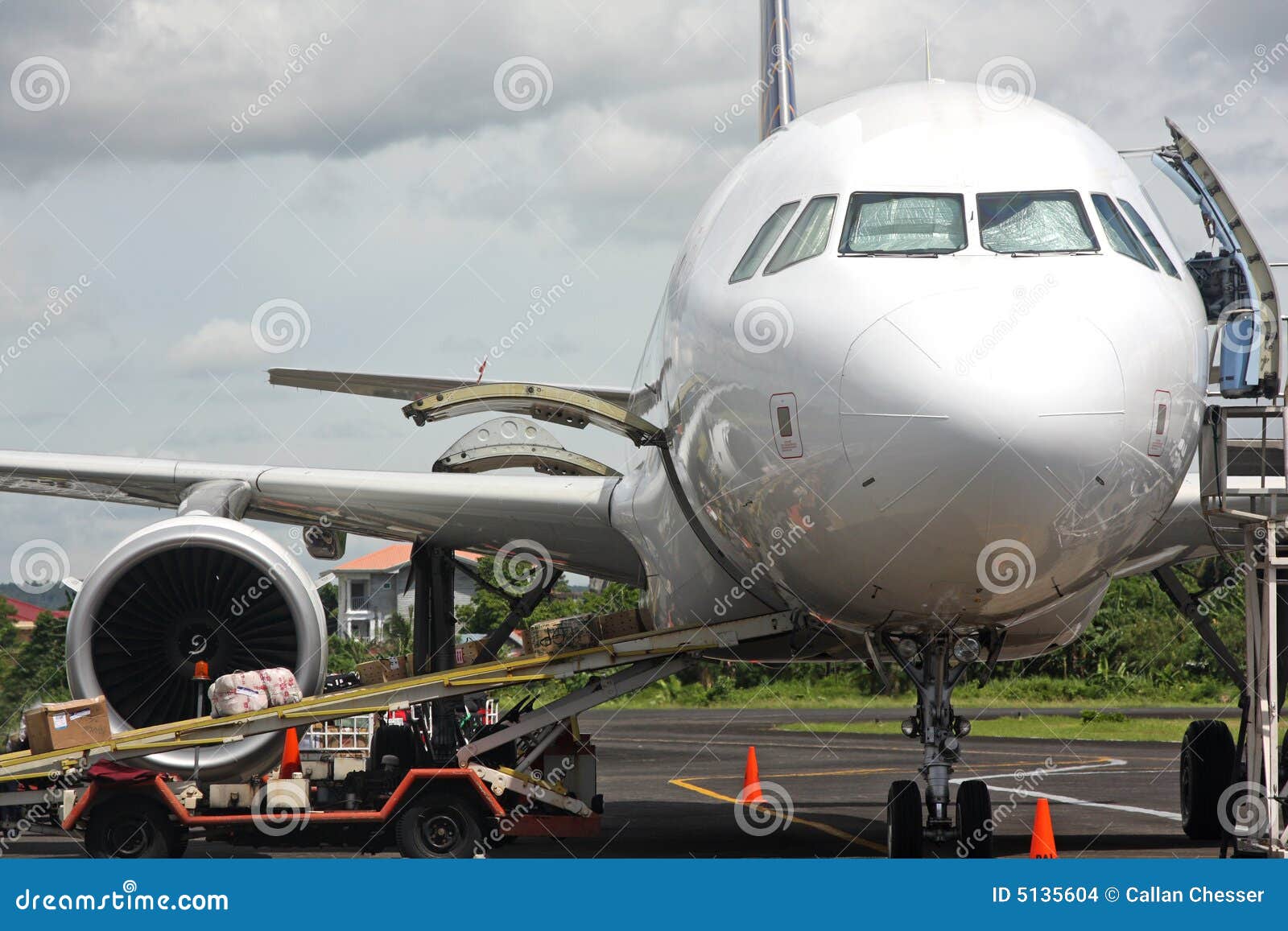 Unloading plane stock photo. Image of holiday, flight - 5135604