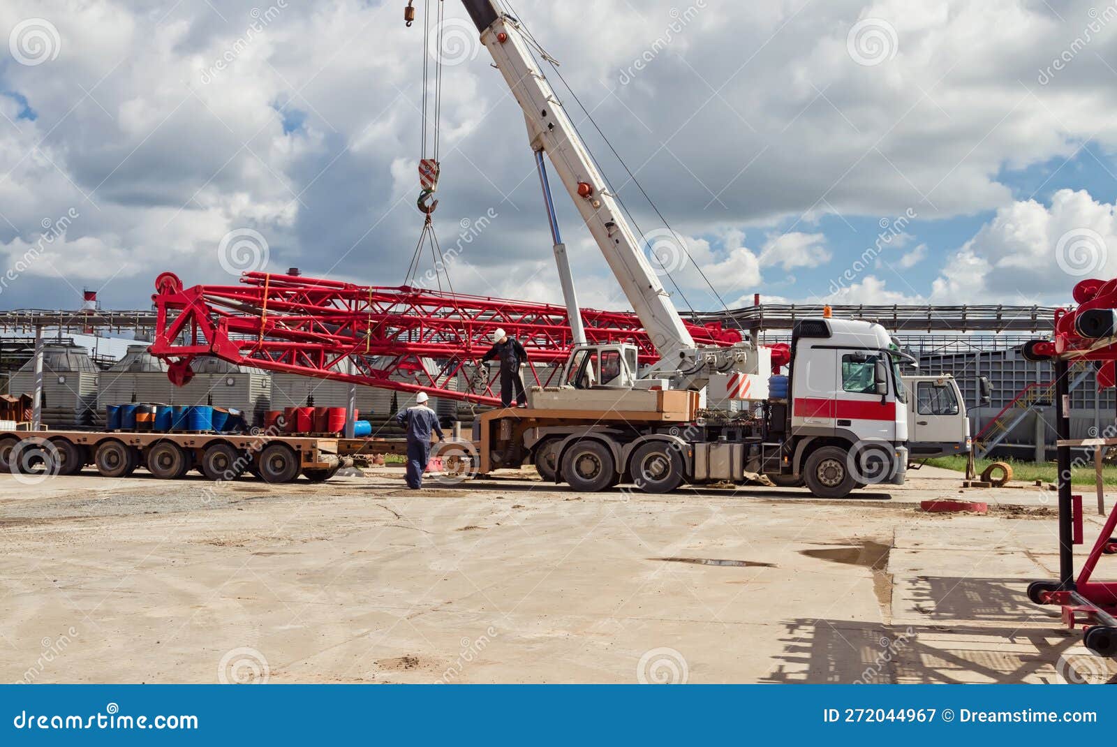 Unloading Sections of the Boom of a Large Crawler Crane Using a Crane ...