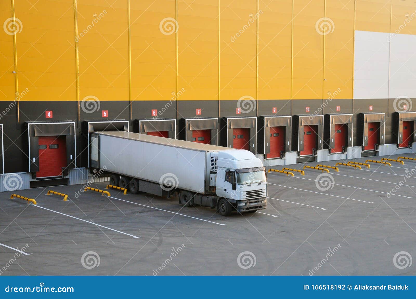 Unloading Trucks at a Modern Warehouse Complex Stock Photo - Image of ...