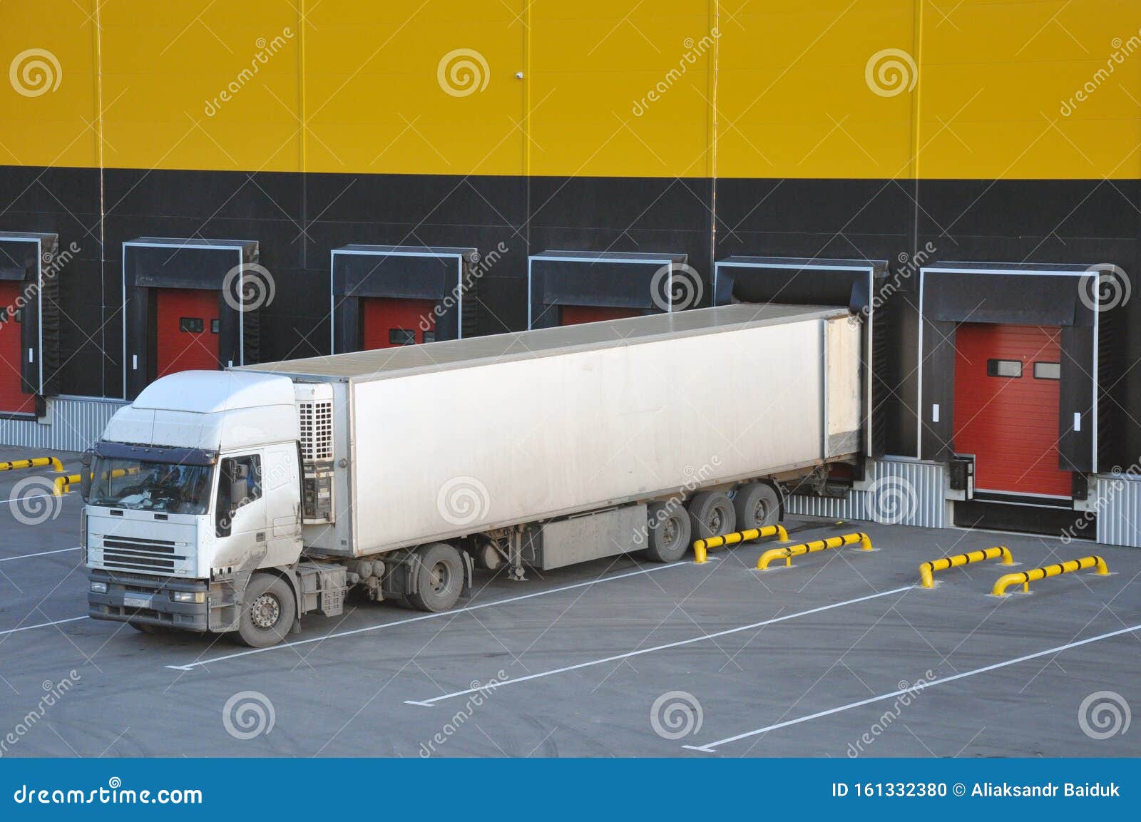 Unloading Trucks At A Modern Warehouse Complex Royalty-Free Stock Photo ...