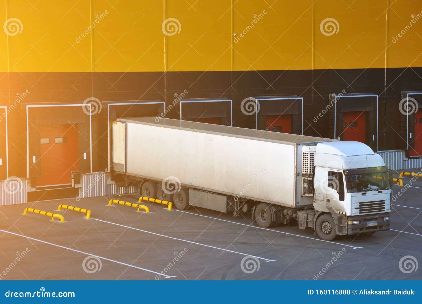 Unloading Trucks at a Modern Warehouse Complex Stock Photo - Image of ...