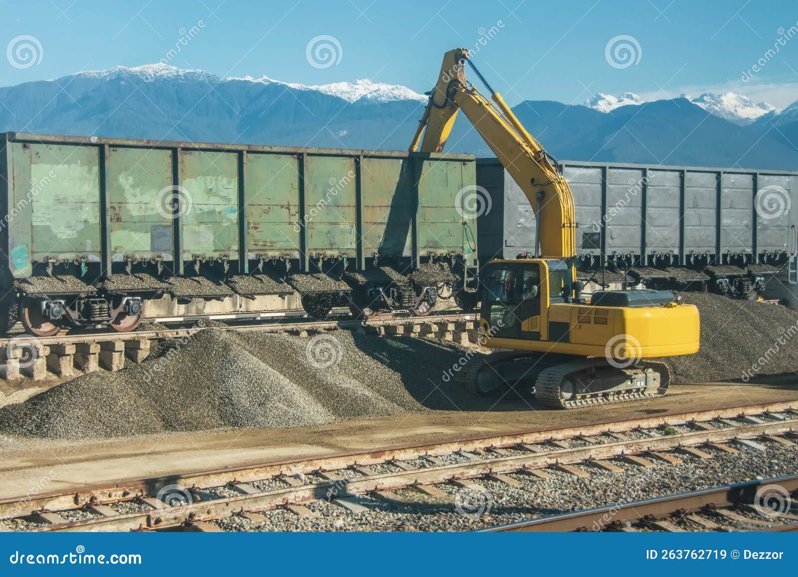 Unloading Unloading Rubble with an Excavator Wagons with Bulk Cargo ...