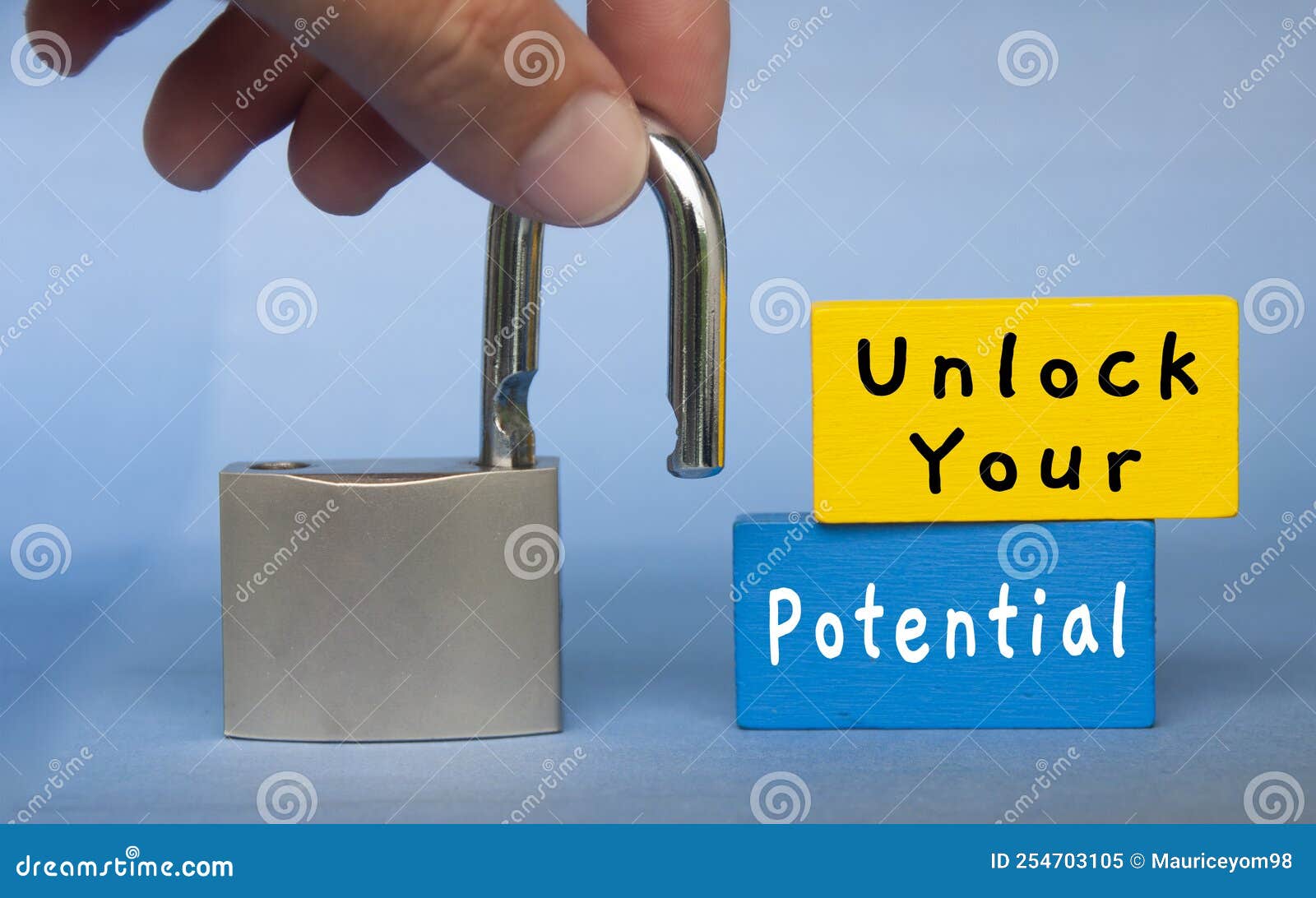 Unlock Your Potential Text Wooden Blocks with Hand Holding Padlock ... Unlock Your Potential Text Wooden Blocks with Hand Holding Padlock ...