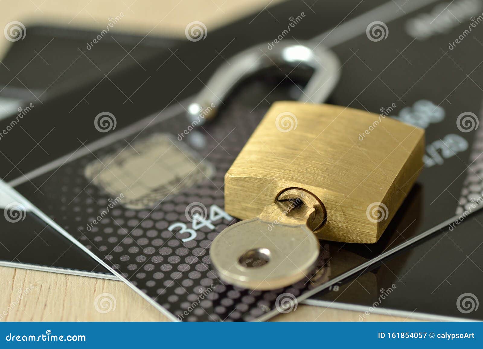 Unlocked Padlock with Key on Credit Card - Concept of Security and ...