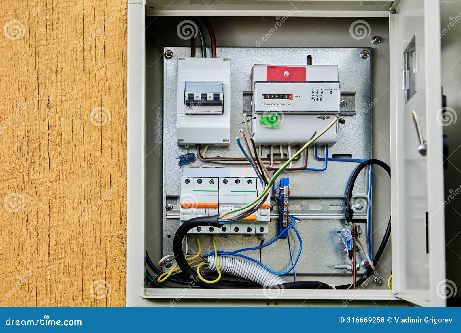 An Unlocked Wall-mounted Outdoor Electrical Panel with an Electricity ...